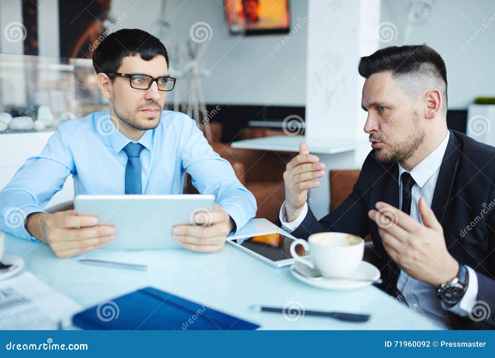Discussion in cafe stock photo. Image of successful, handsome - 71960092