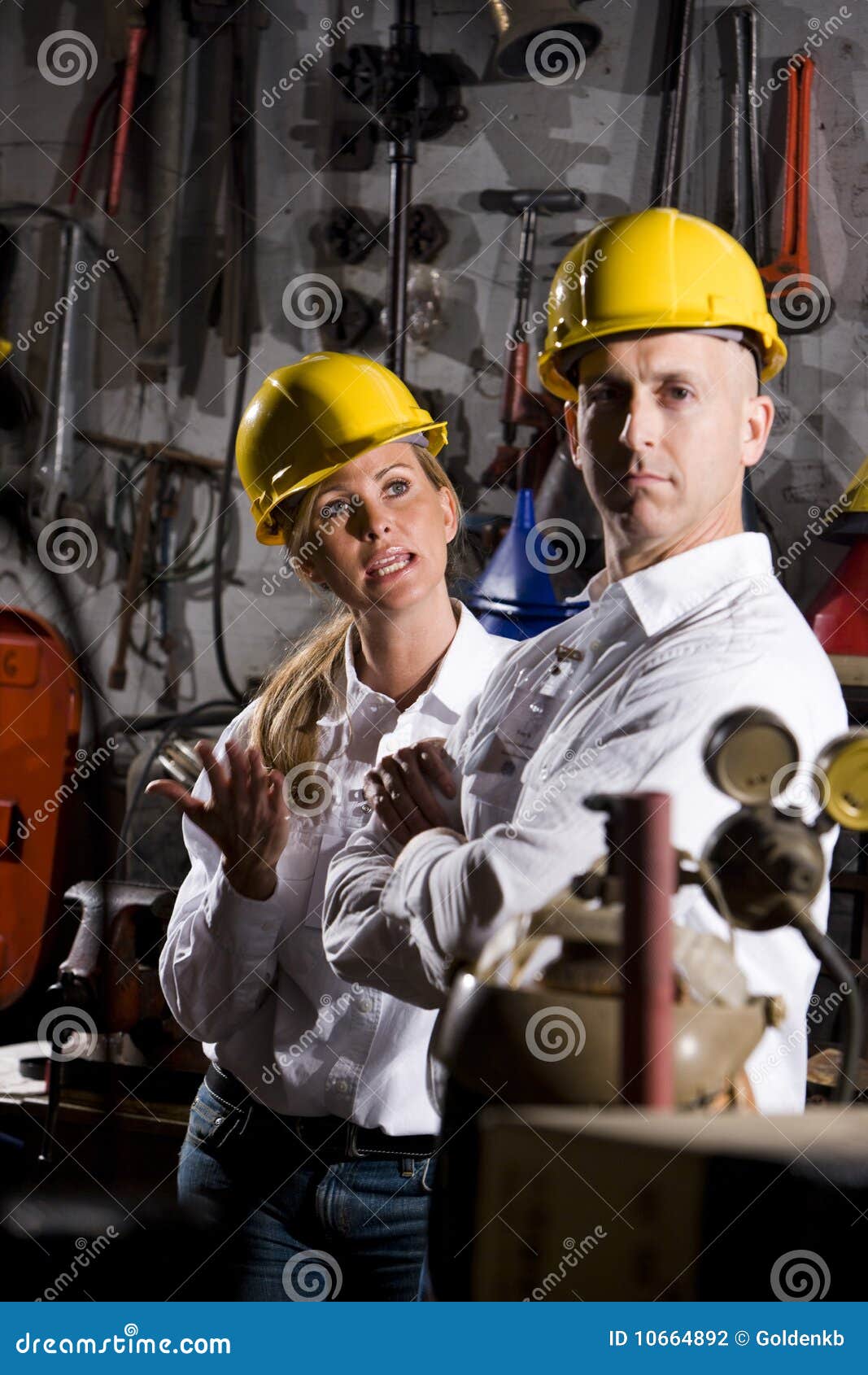 Discussion in Maintenance Room Stock Photo - Image of male, denim: 10664892