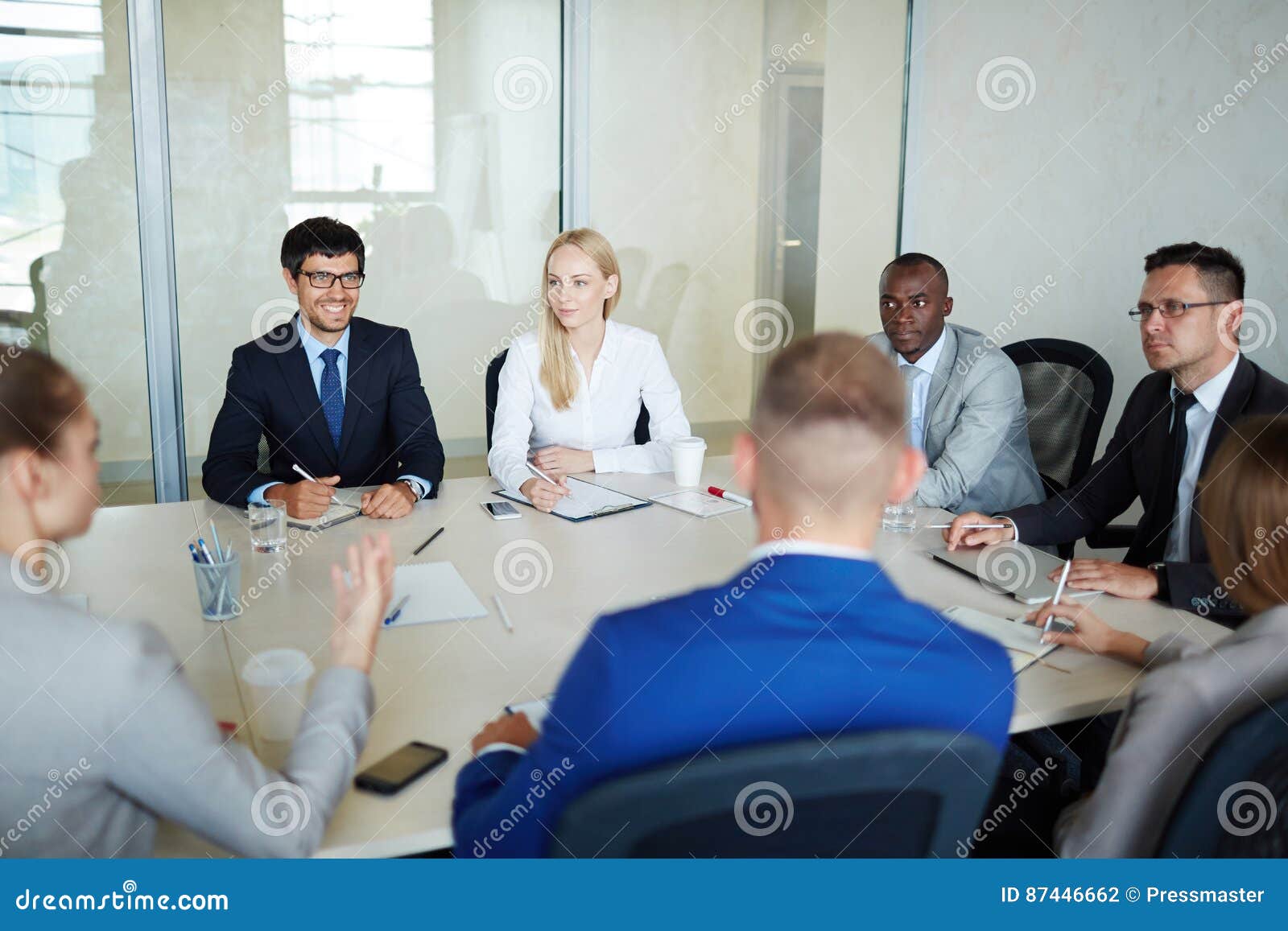 Discussion at meeting stock photo. Image of executive - 87446662