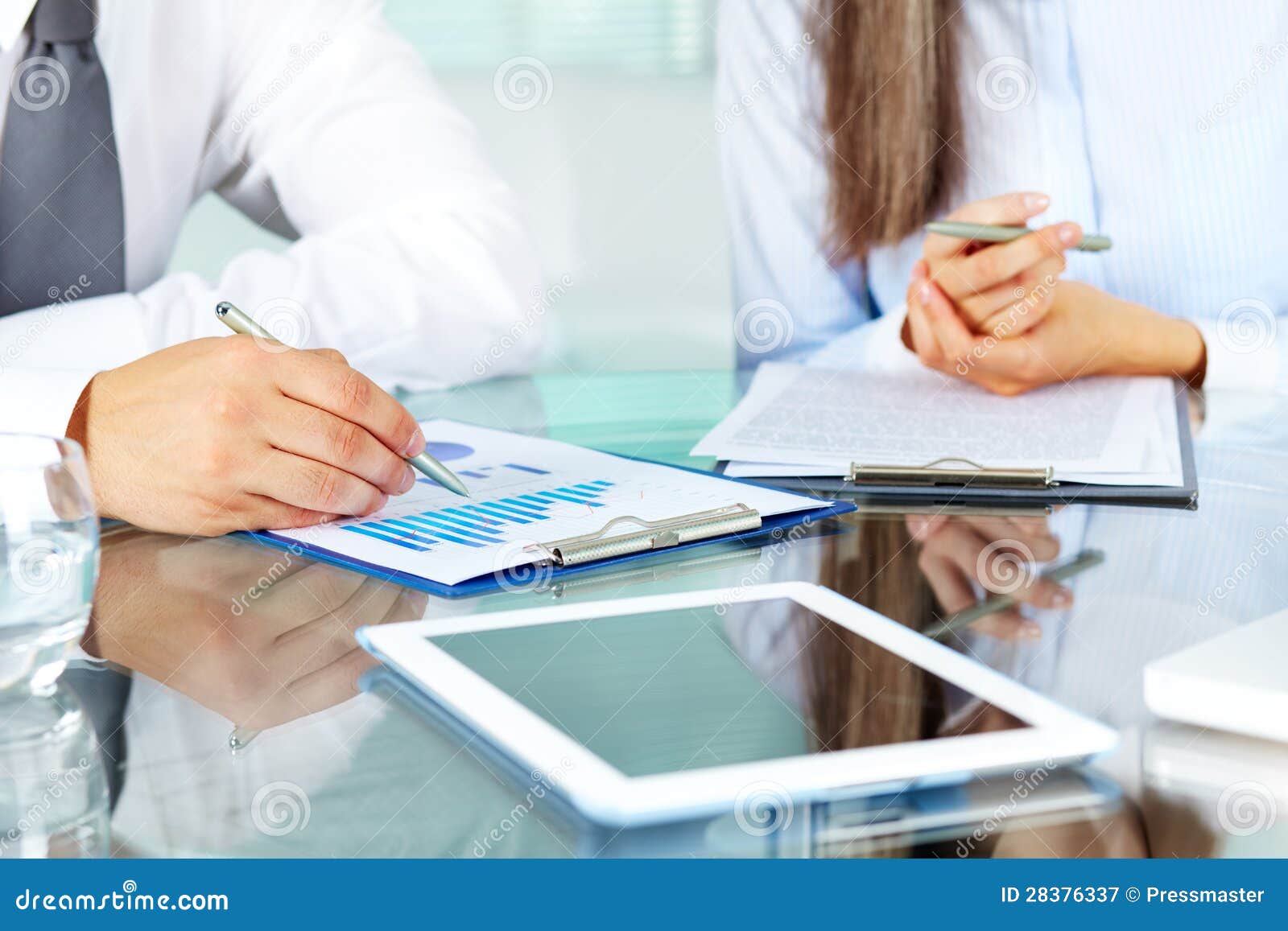 Discussion of papers stock image. Image of document, environment - 28376337