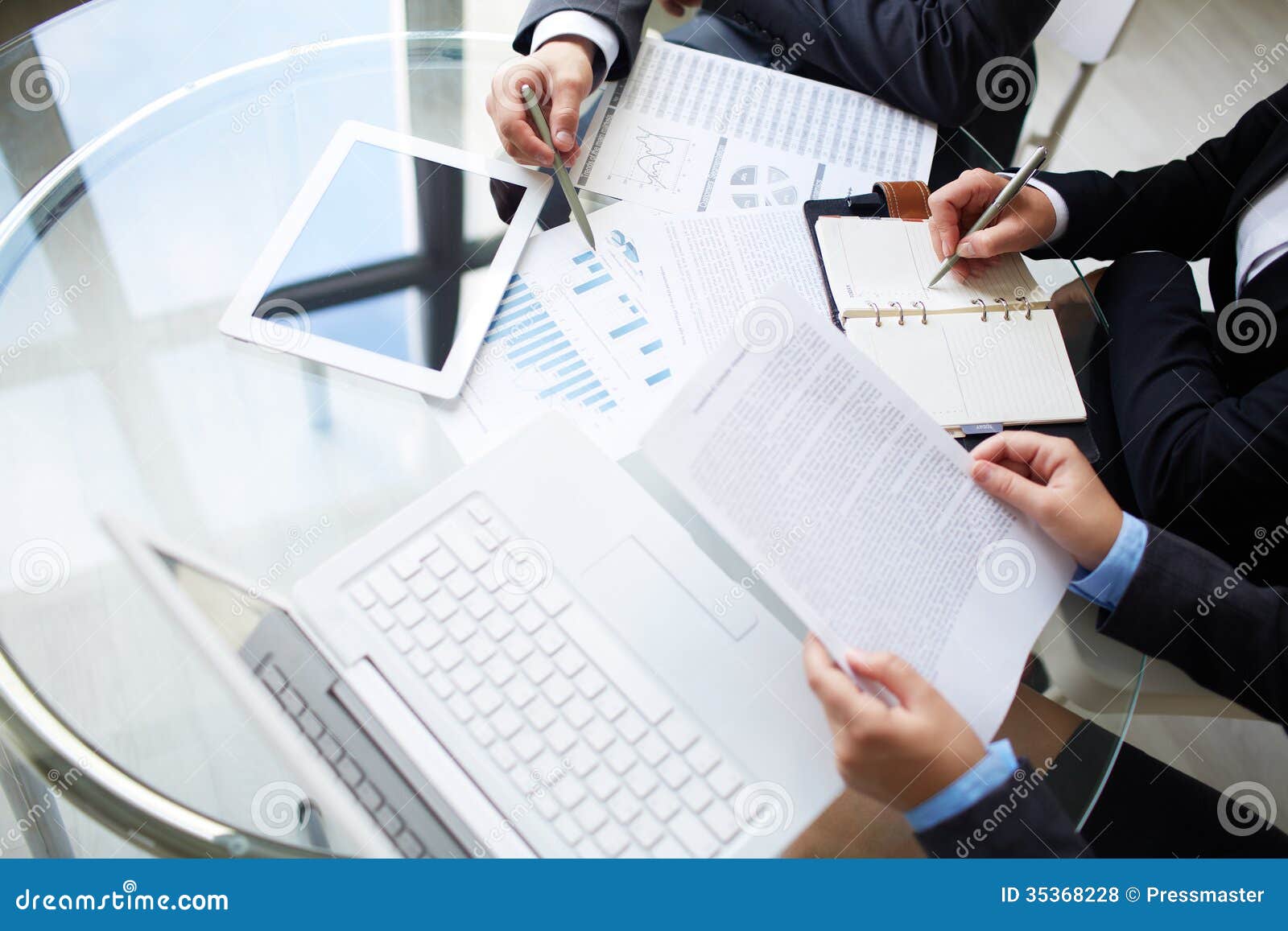 Discussion of papers stock photo. Image of economics - 35368228