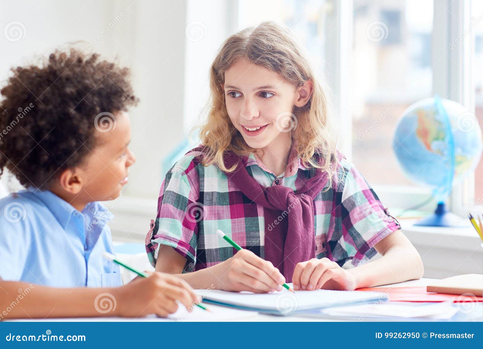 Discussion of schoolboys stock photo. Image of studying - 99262950