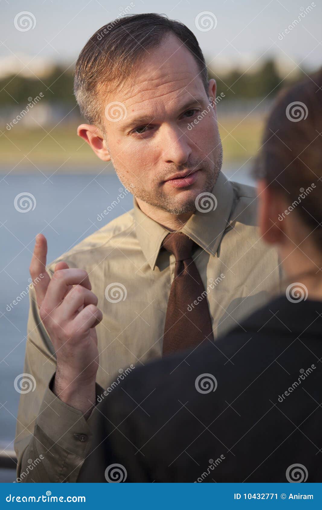 Discussion on the street stock image. Image of conversation - 10432771