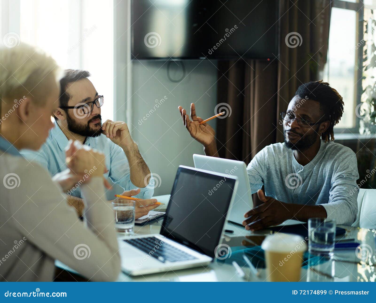 Discussion of Young Colleagues Stock Image - Image of discussion ...