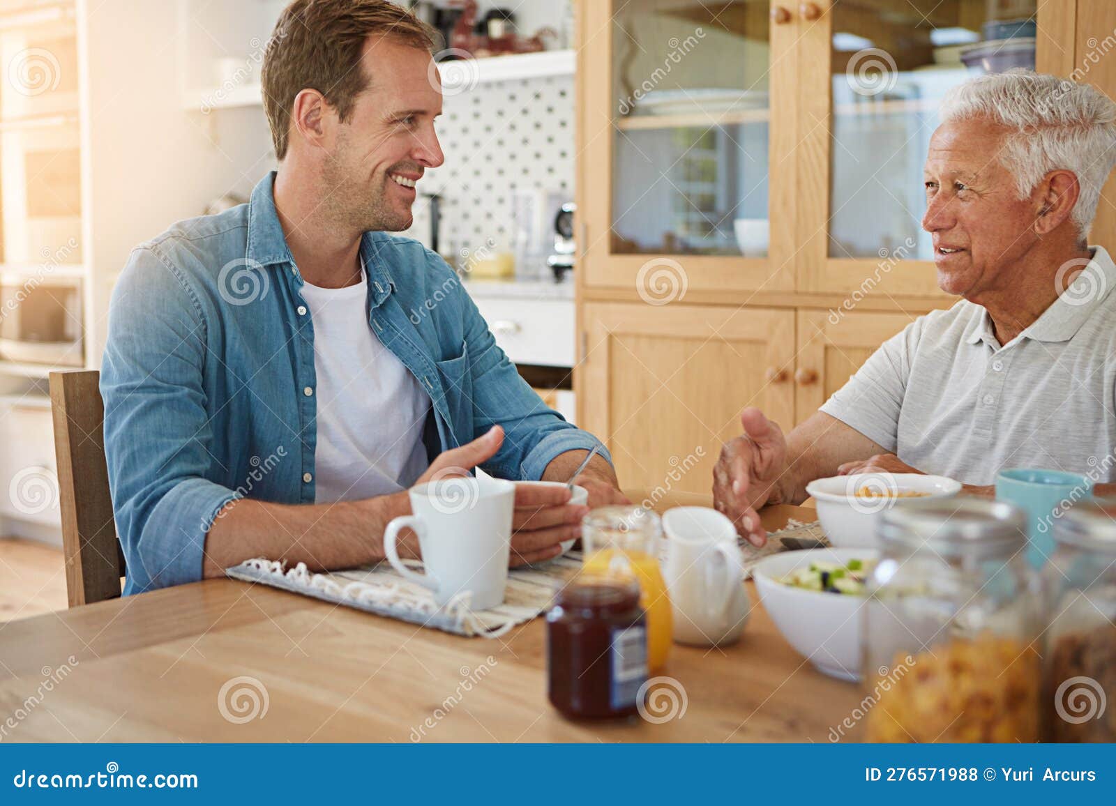 Discussions with Dad at the Breakfast Table. a Man Having Breakfast ...