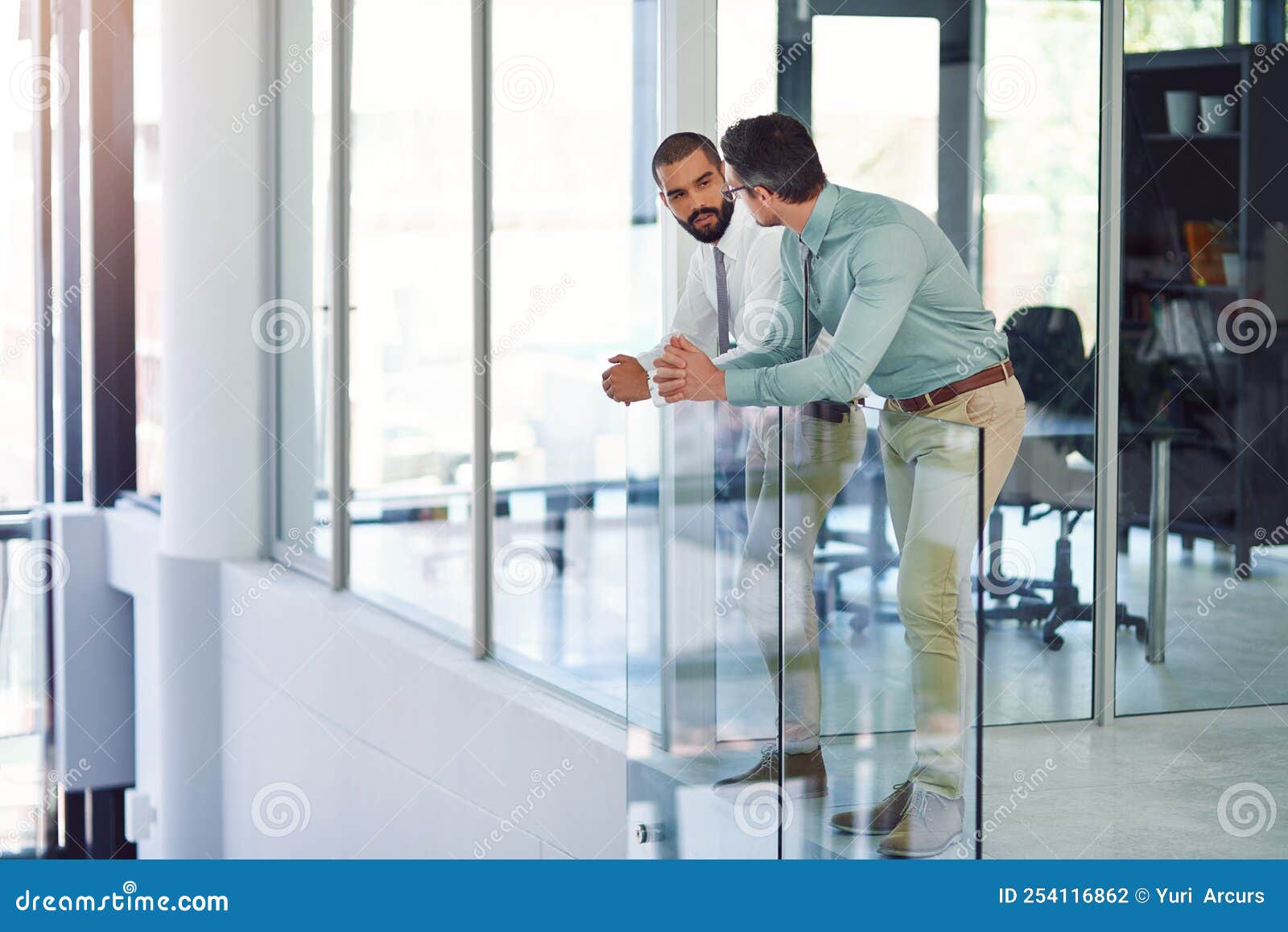 Discussions at the Office. Colleagues Having a Discussion in a Modern ...