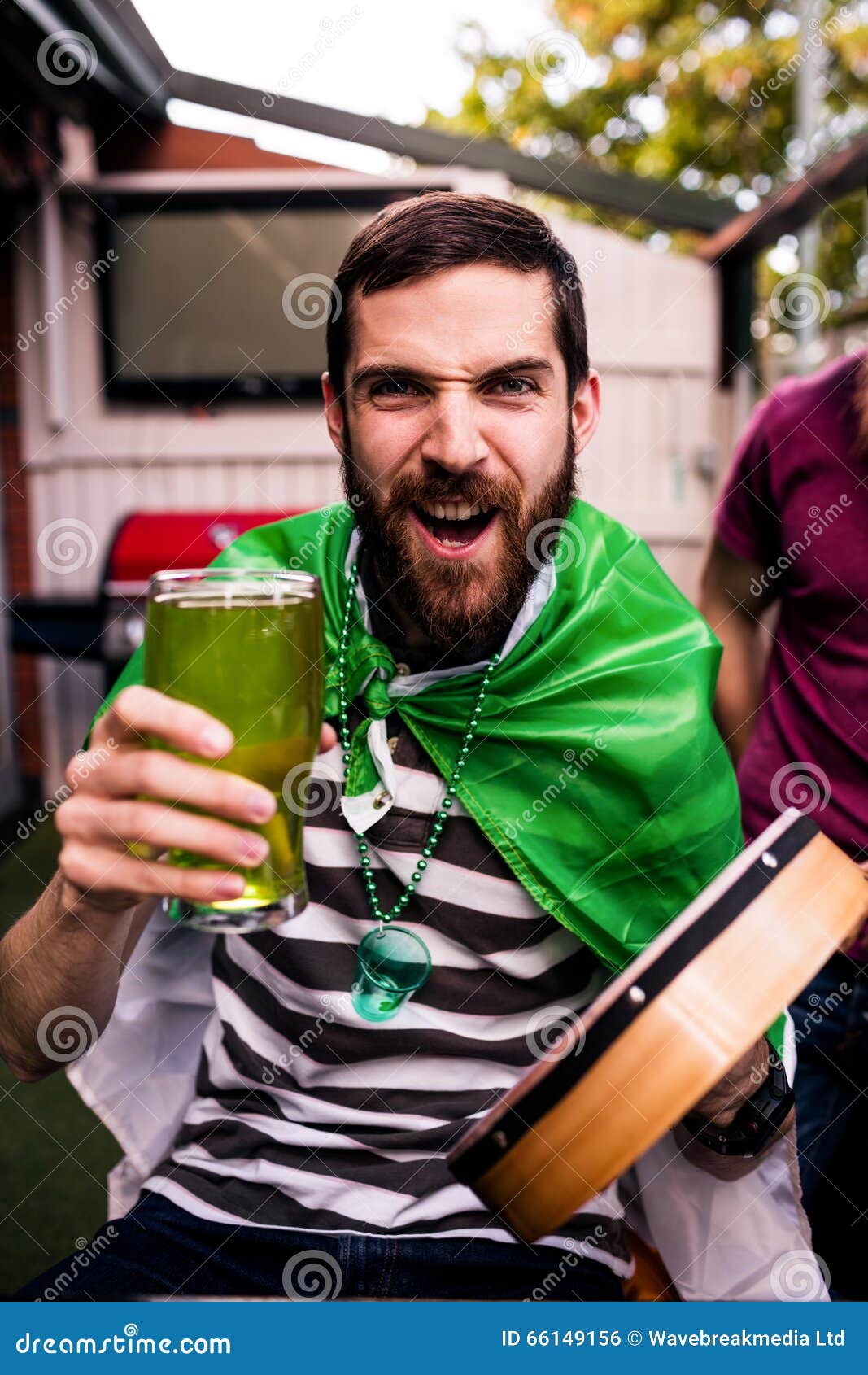 Disguised Man Holding a Green Pint Stock Photo - Image of affection ...