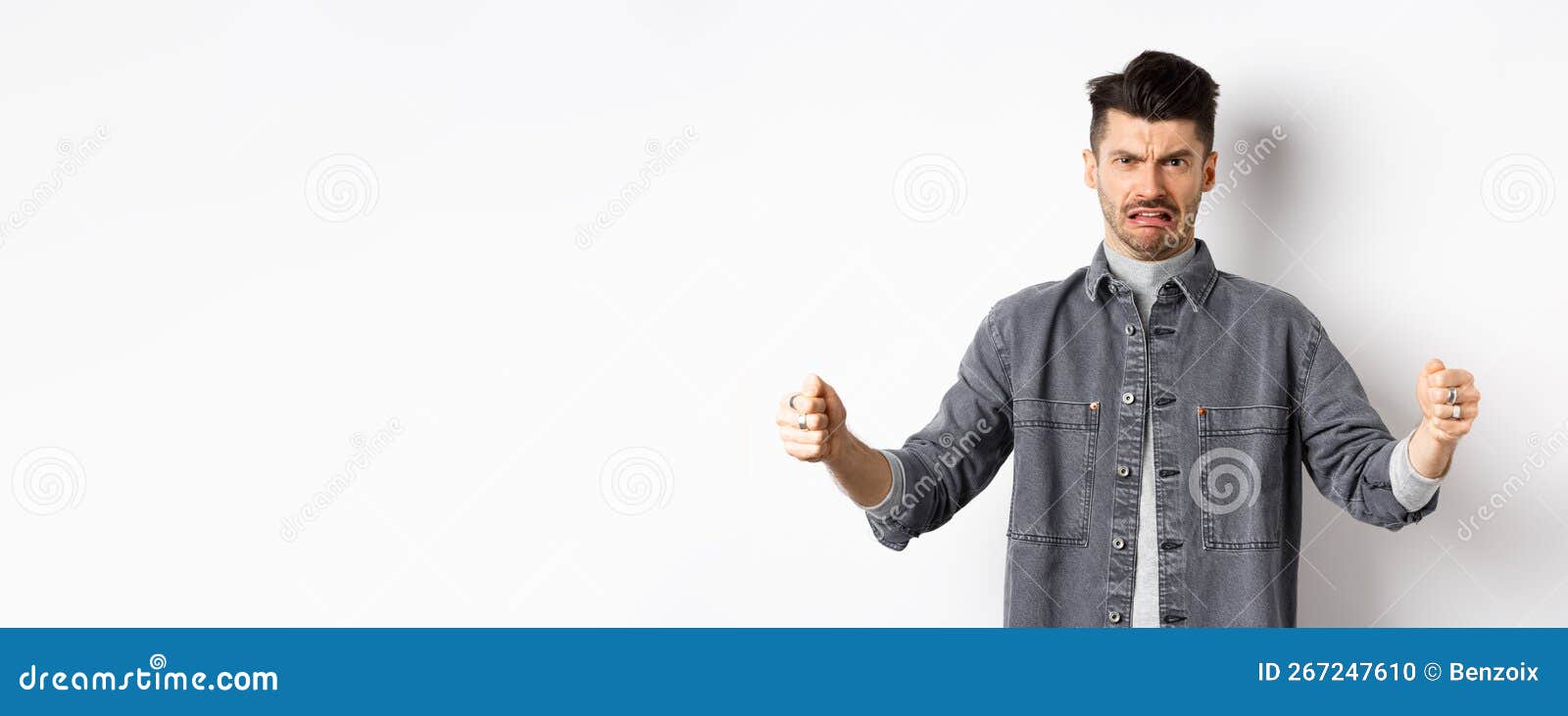 Disgusted Guy Showing Big Size Object and Grimacing from Dislike and ...