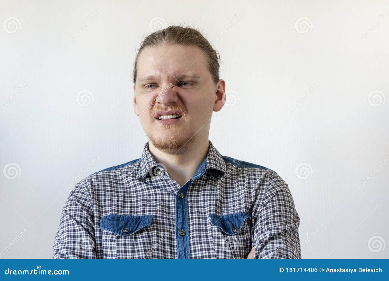Disgusted Man in a Plaid Shirt. Isolate on White Background Stock Photo ...