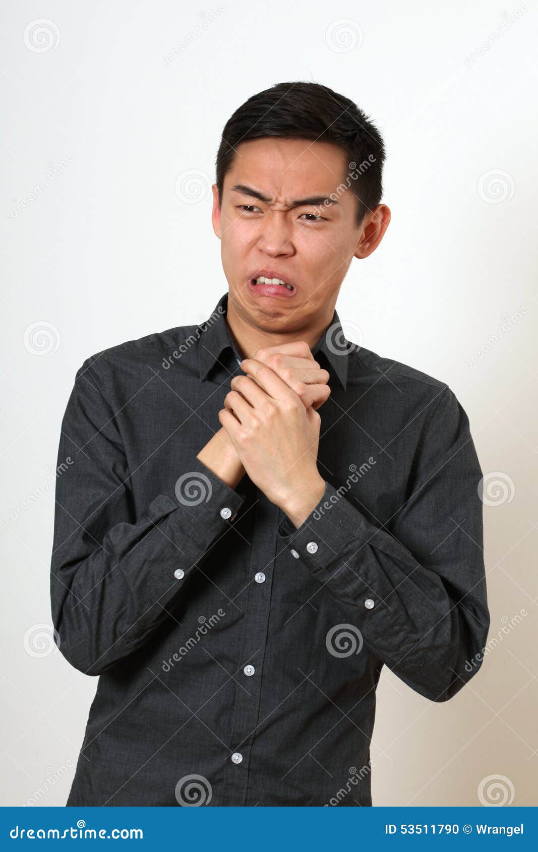 Disgusted Young Asian Man Looking Sideways Stock Photo - Image of ...