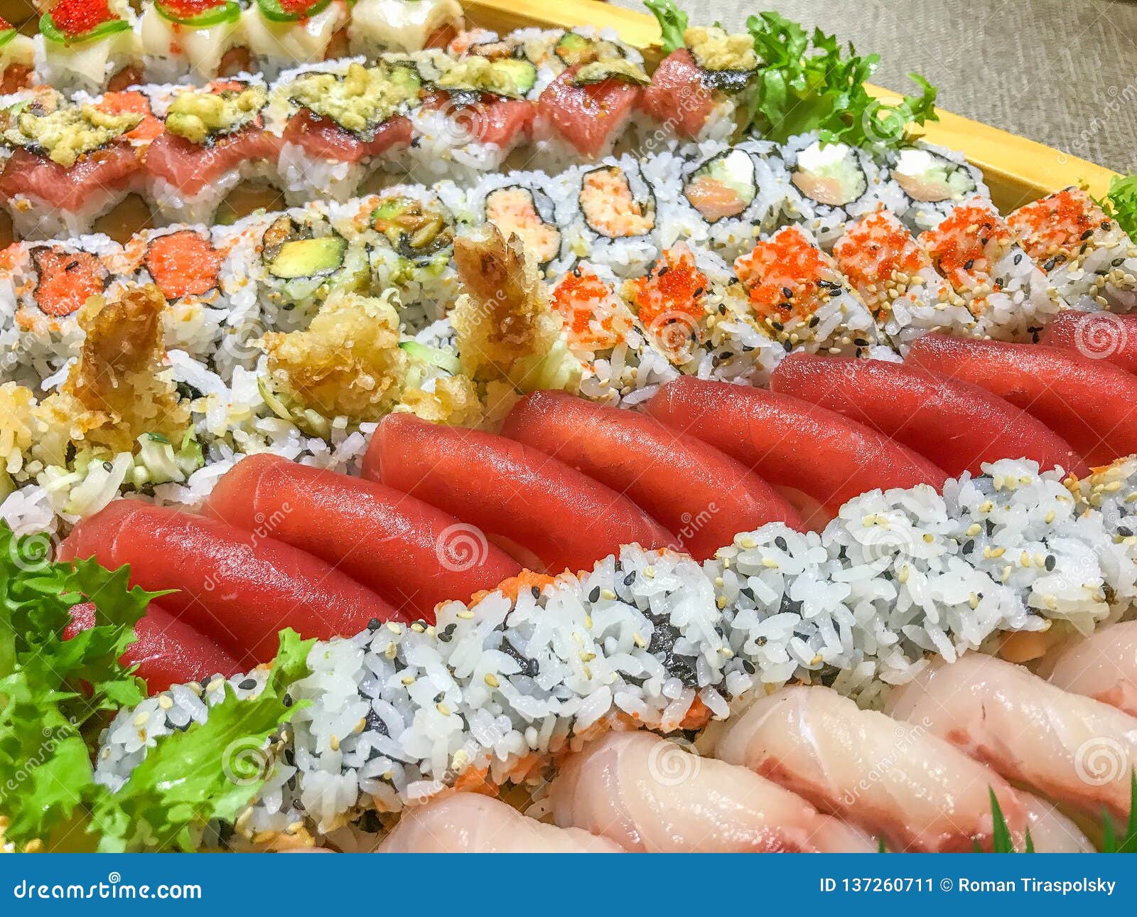 Dish of assorted sushi stock image. Image of colorful - 137260711