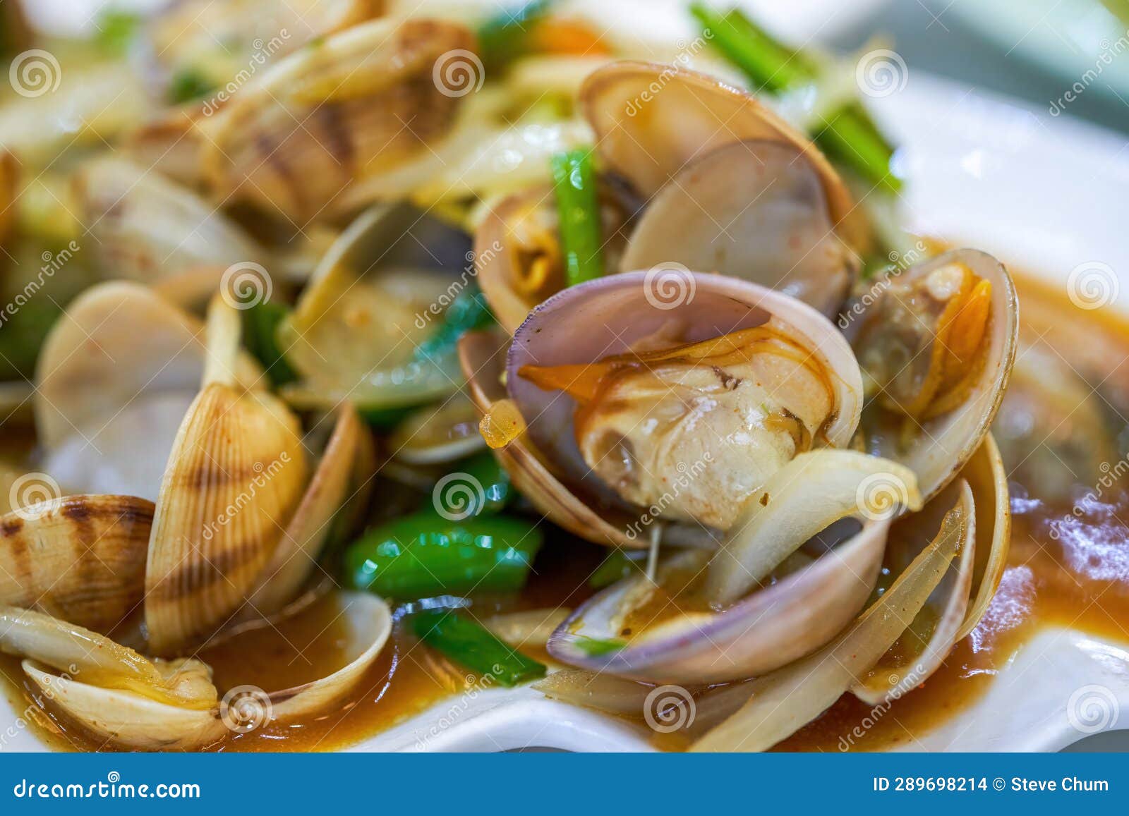 A Dish of Delicious Fragrant Fried Flower Conch Seafood Stock Photo ...