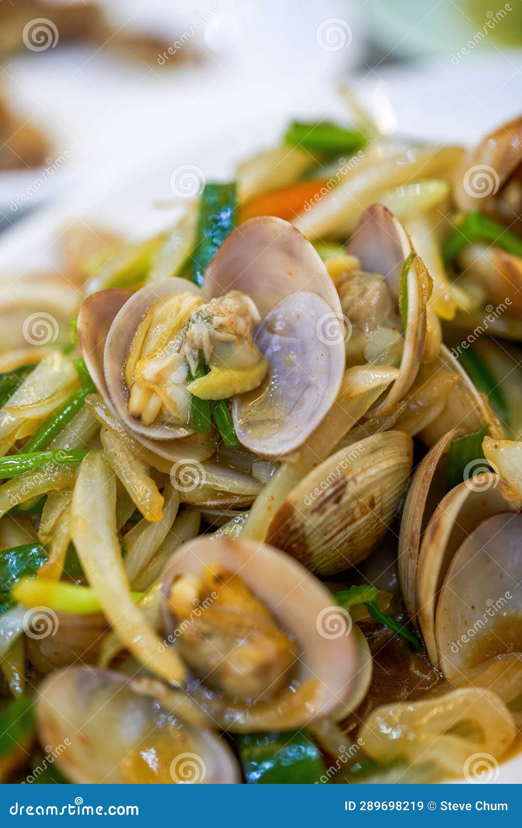 A Dish of Delicious Fragrant Fried Flower Conch Seafood Stock Image ...