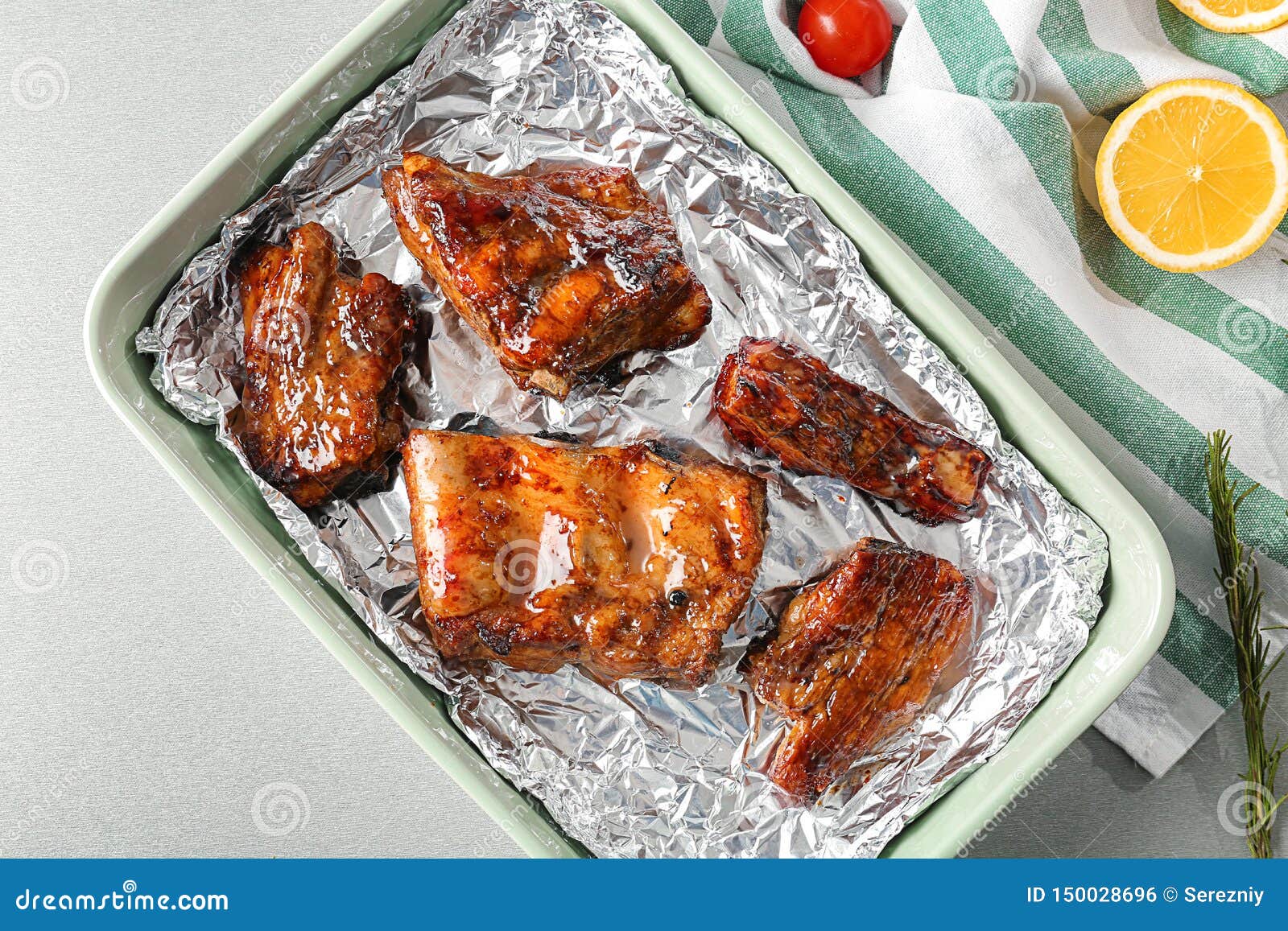Dish with Delicious Grilled Ribs on Table, Top View Stock Photo - Image ...