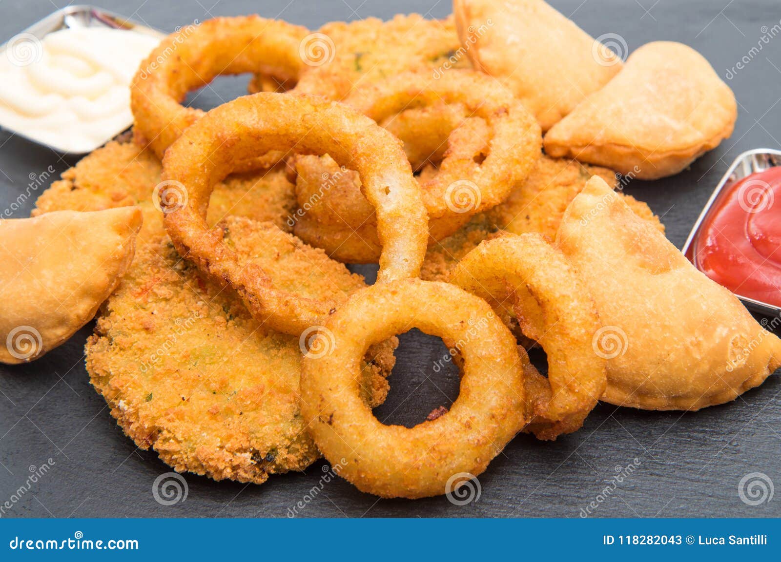 Fried mixed appetizers stock image. Image of typical - 118282043