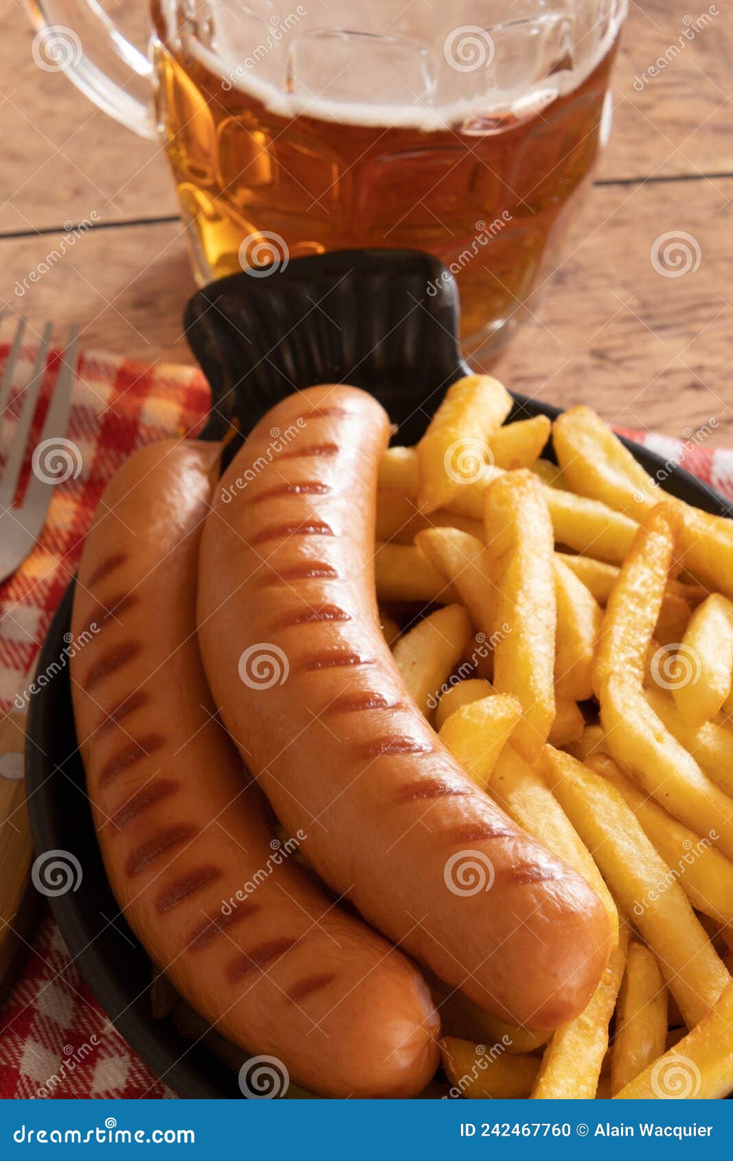 Dish of Fries with Frankfurters and a Beer Stock Photo - Image of tasty ...