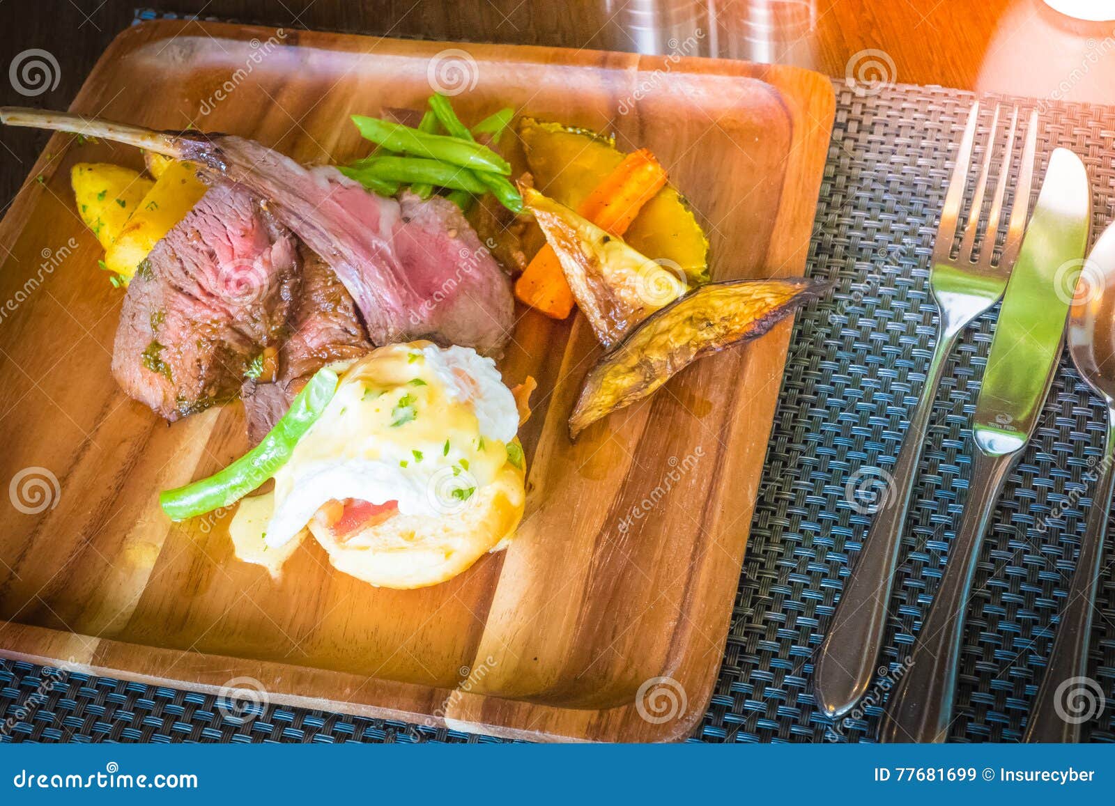 A Dish of Lamb Steak with Egg Benedict Stock Image - Image of culinary ...