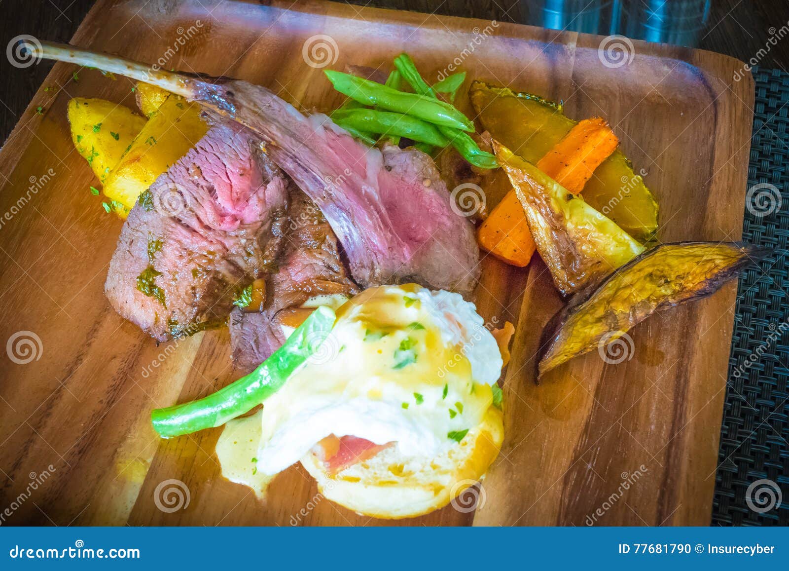 A Dish of Lamb Steak with Egg Benedict Stock Photo - Image of bacon ...