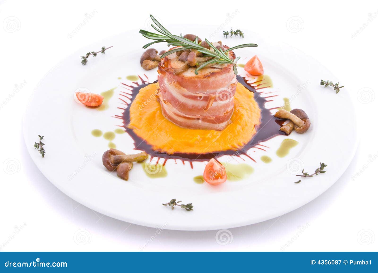 Dish with Meat of the Rabbit Wrapped Up by Bacon Stock Image - Image of ...
