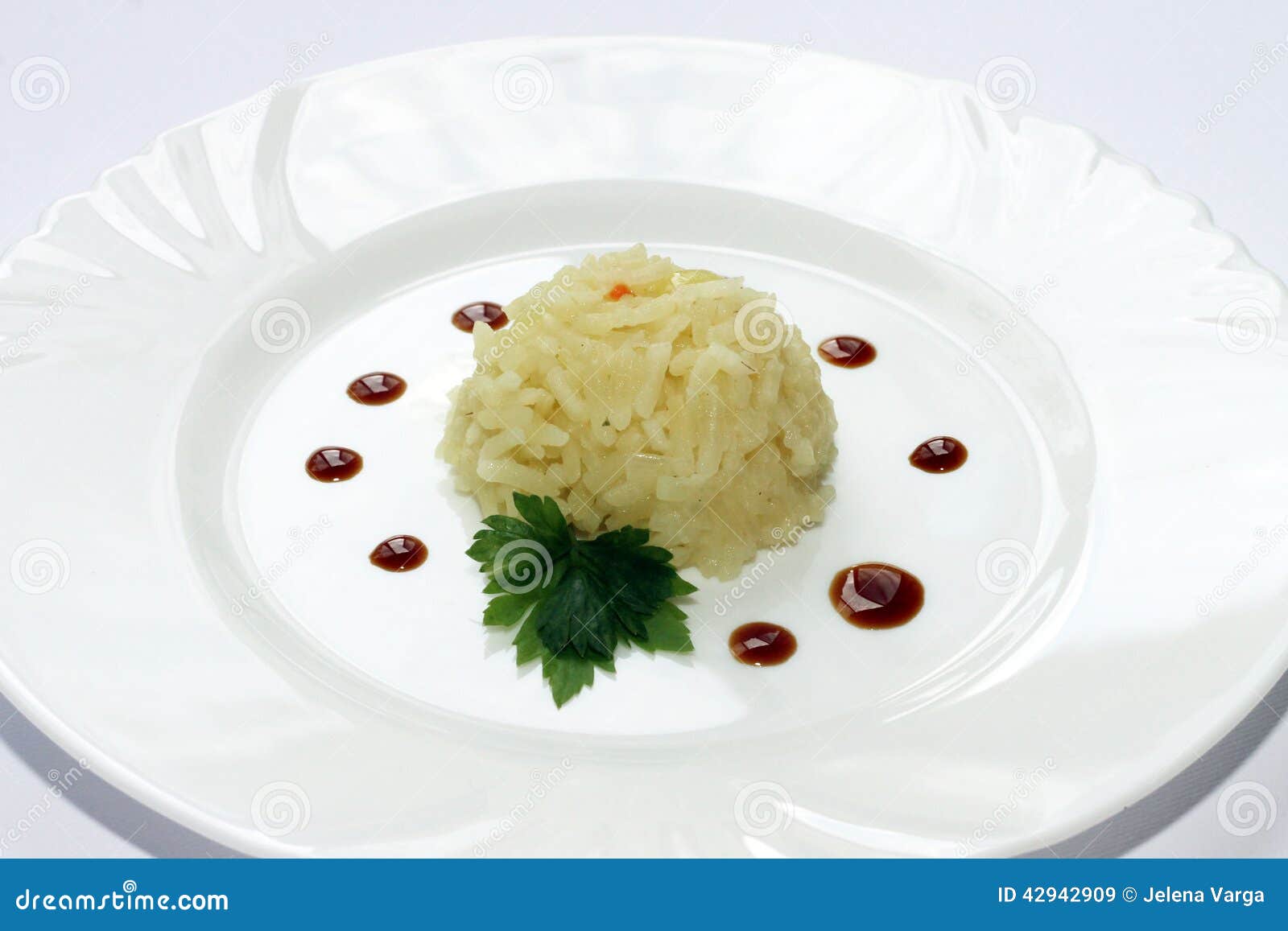 Dish of rice on a plate stock image. Image of delicious - 42942909