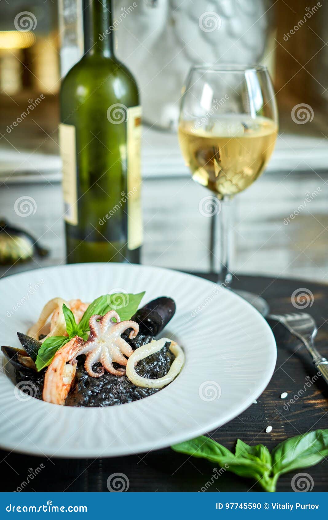 Dish of Risotto with Squid Ink on Grey Plate Jpg Stock Photo - Image of ...