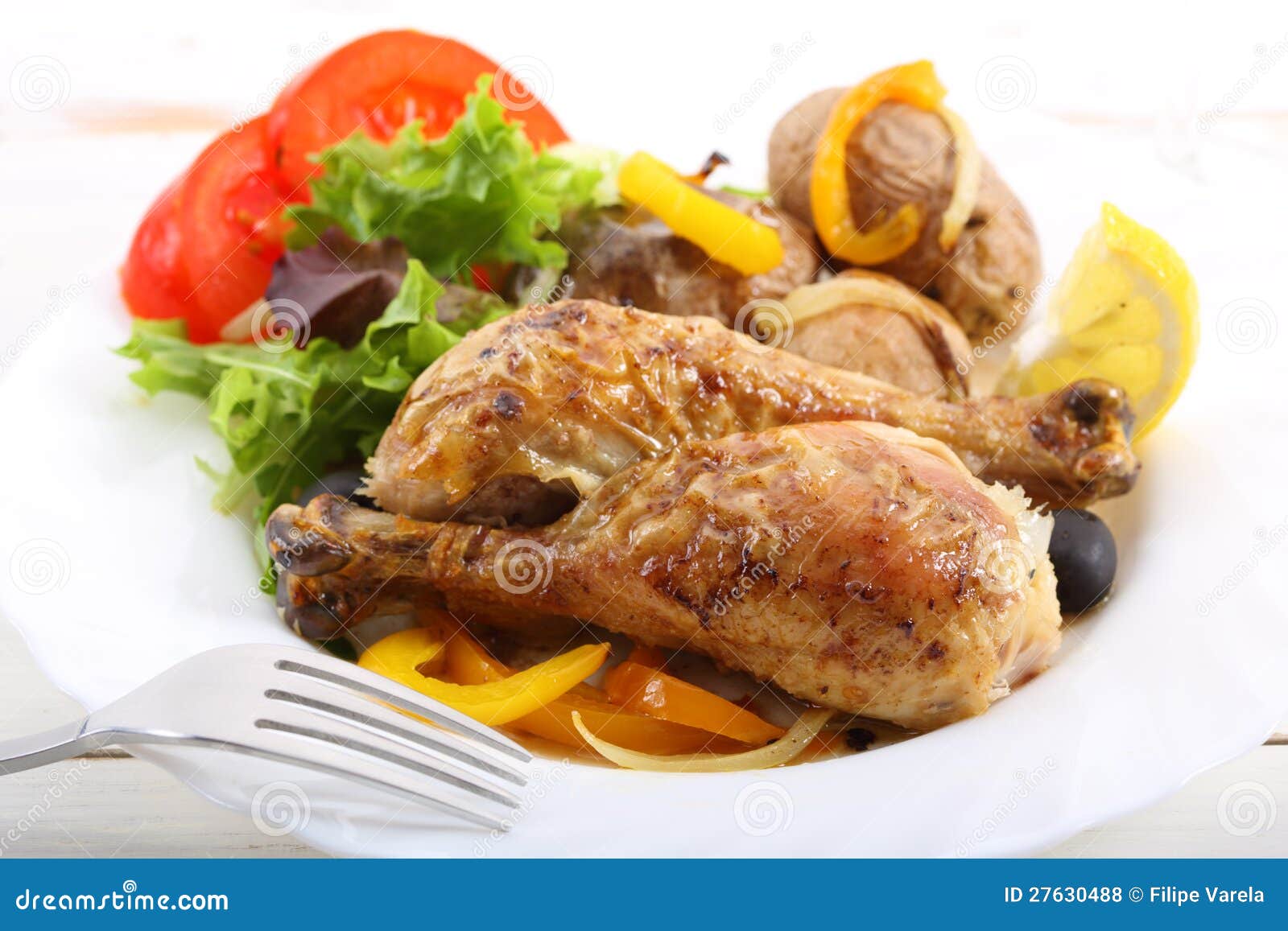 Dish of Roasted Chicken Legs Stock Photo - Image of onions, lunch: 27630488