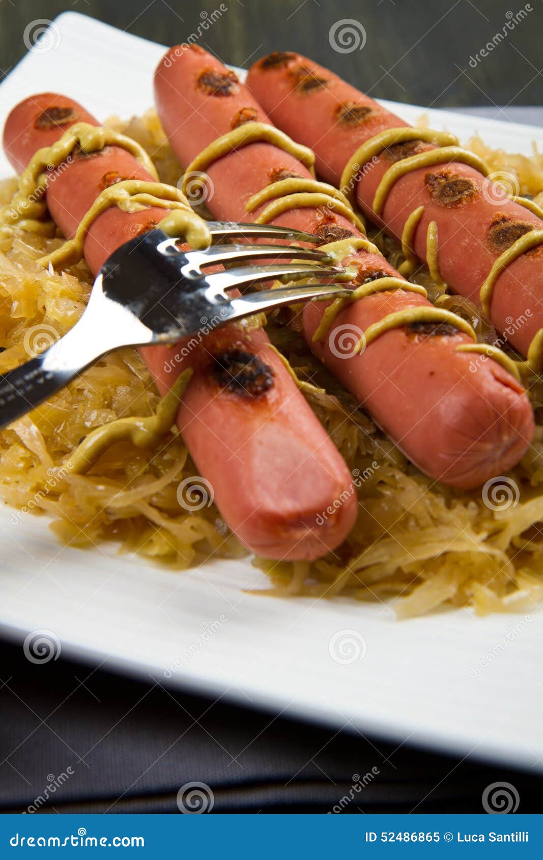 Dish with Roasted Wurstel and Sauerkraft Stock Image - Image of ...