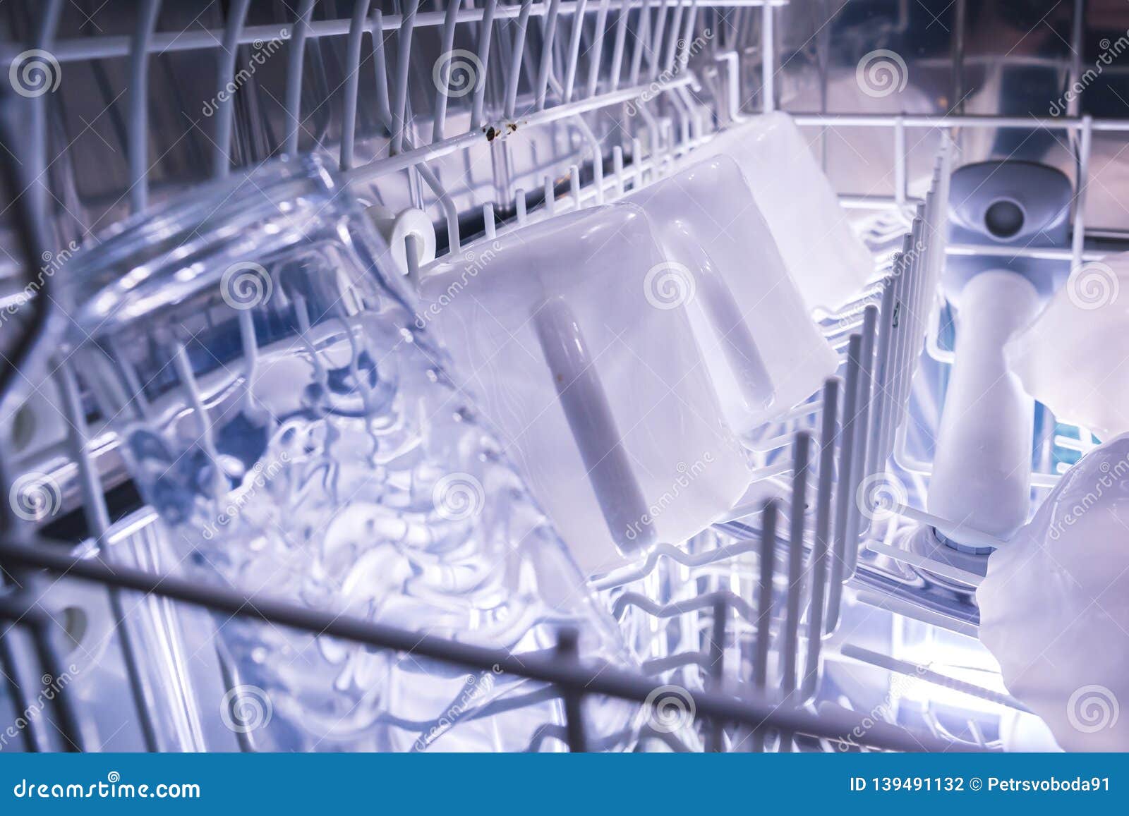Dishes in the Open Dishwasher Inside, Clean Dishware. Dishwasher ...