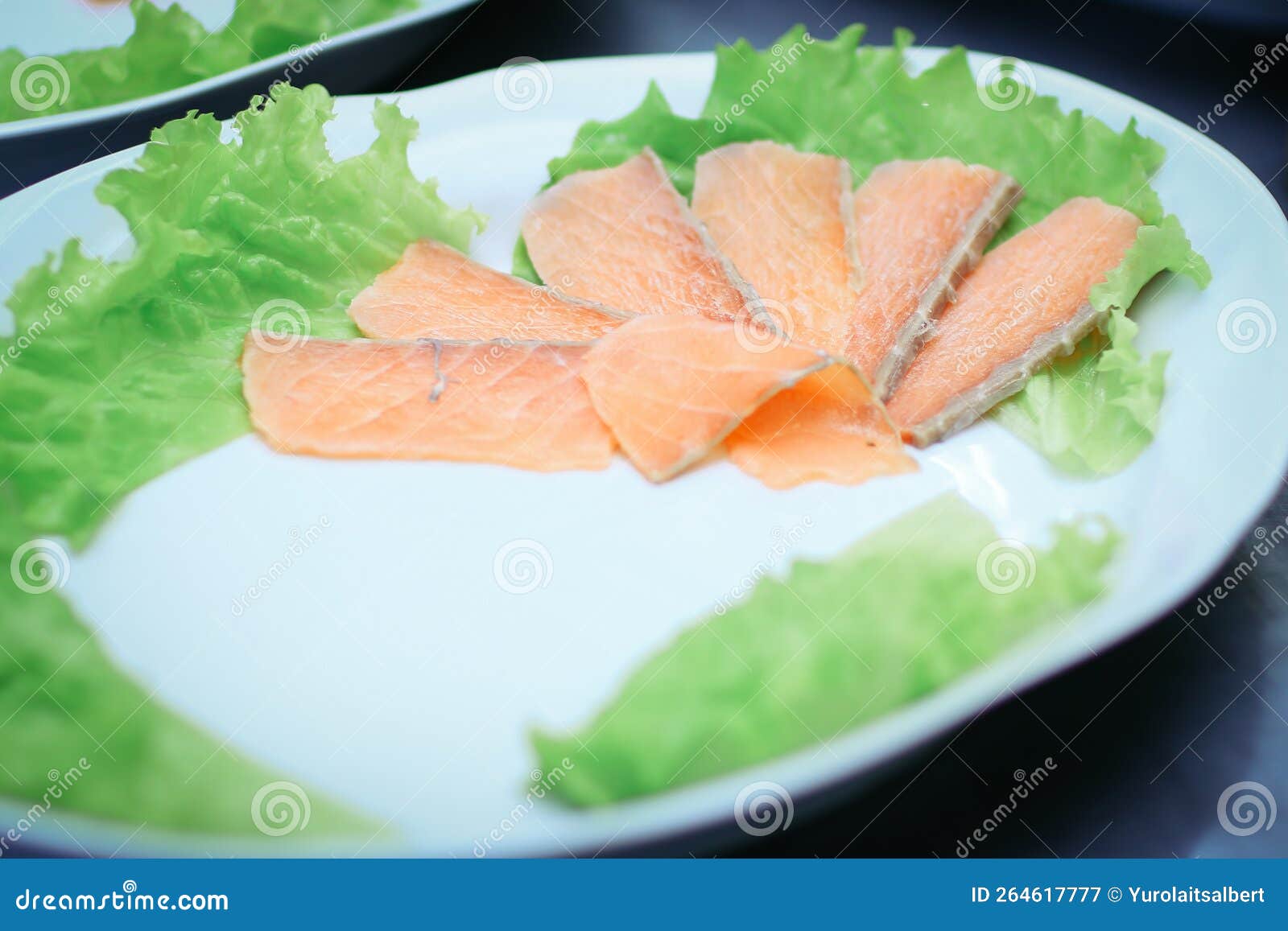 Dishes with Red Fish on the Table in the Kitchen of the Restaurant ...