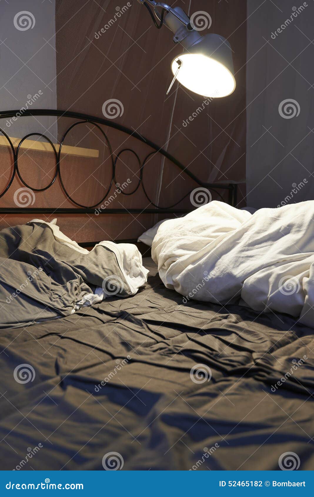 Disheveled Sheets and Pillows of an Unmade Bed Stock Photo - Image of ...
