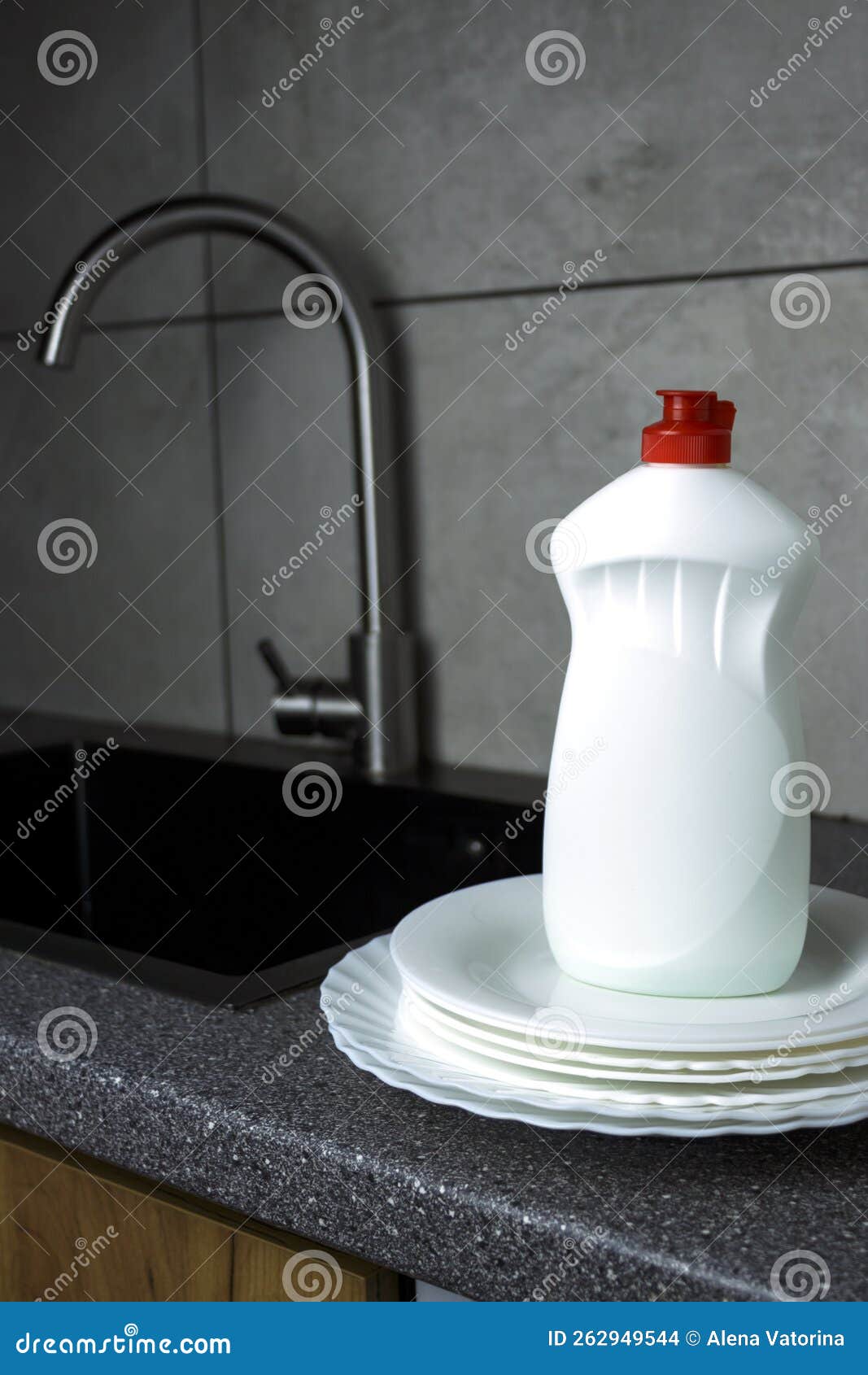 Dishwashing Detergent and Different Clean Plates on the Table on ...