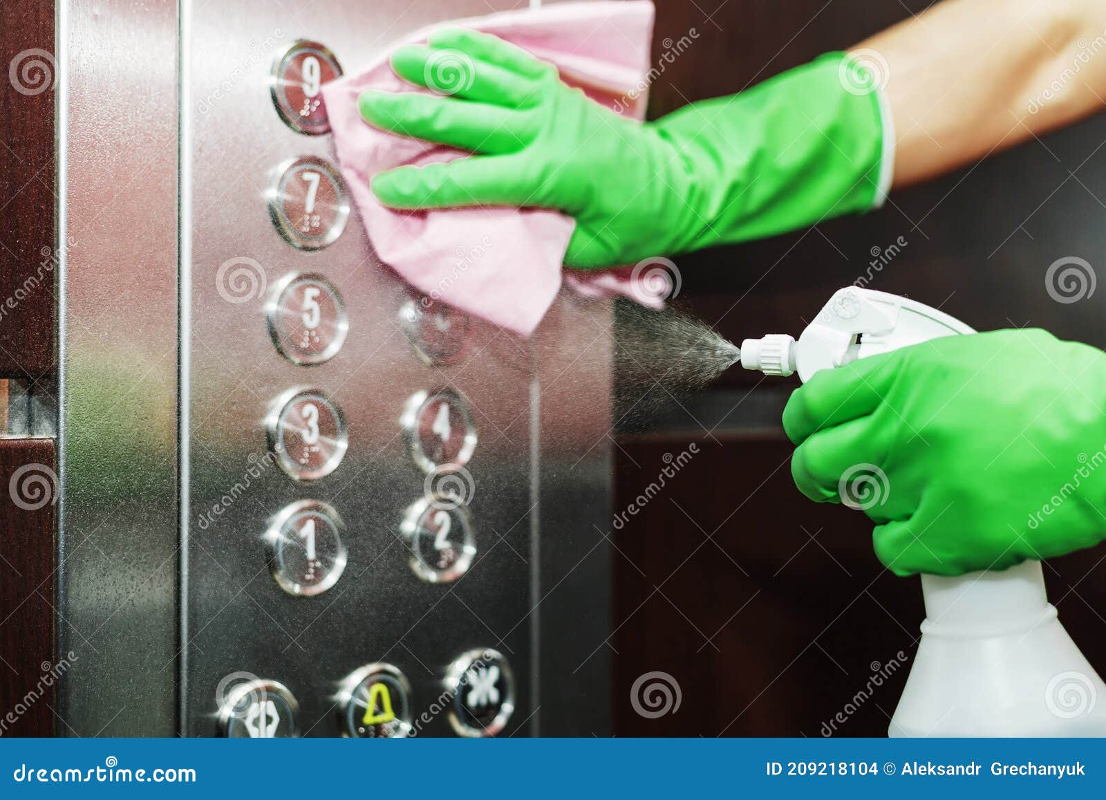 Disinfection and Hygienic Care Using Alcohol Spray on the Elevator ...