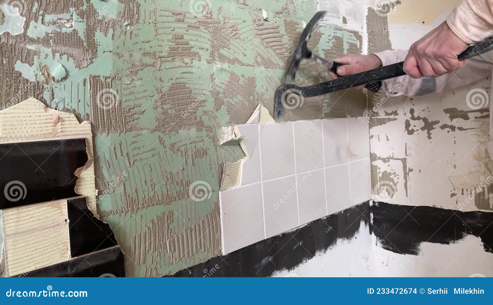 Dismantling Ceramic Tiles with a Chisel and a Hammer. Repair Work Stock ...