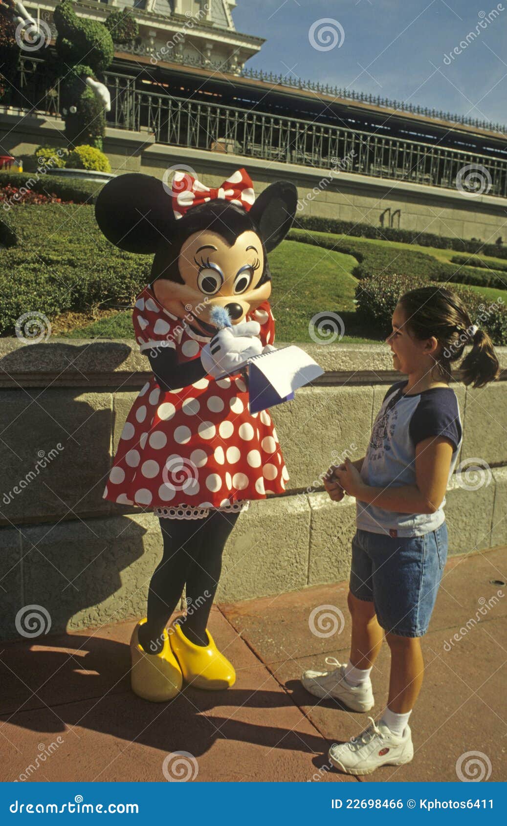 Disney World Magic Kingdom - Minnie Mouse and Fan Editorial Photo ...