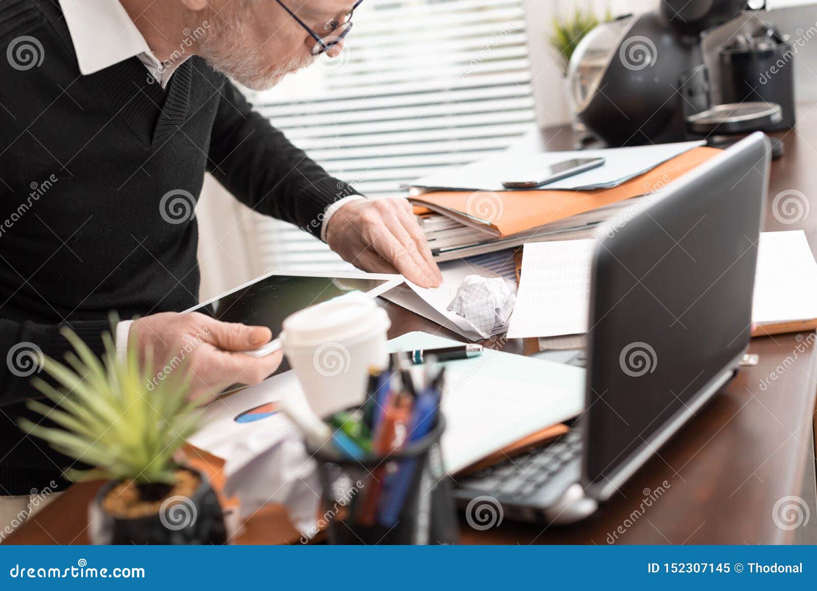 Disorganized Businessman Looking for Documents Stock Image - Image of ...