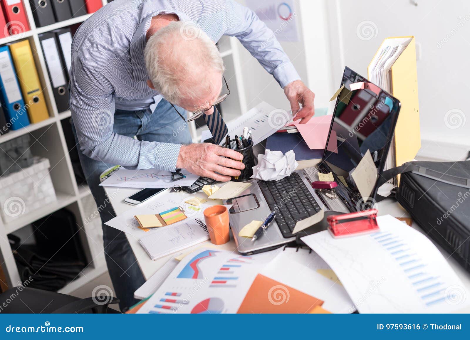 Disorganized Businessman Looking for Documents Stock Photo - Image of ...