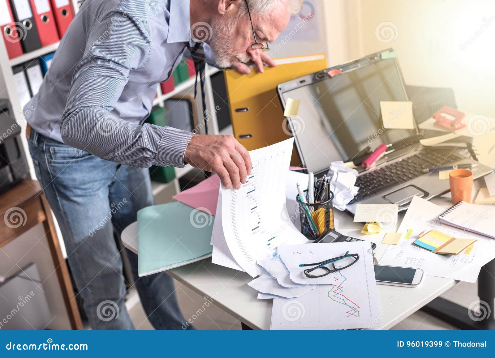 Disorganized Businessman Looking for Documents, Light Effect Stock ...