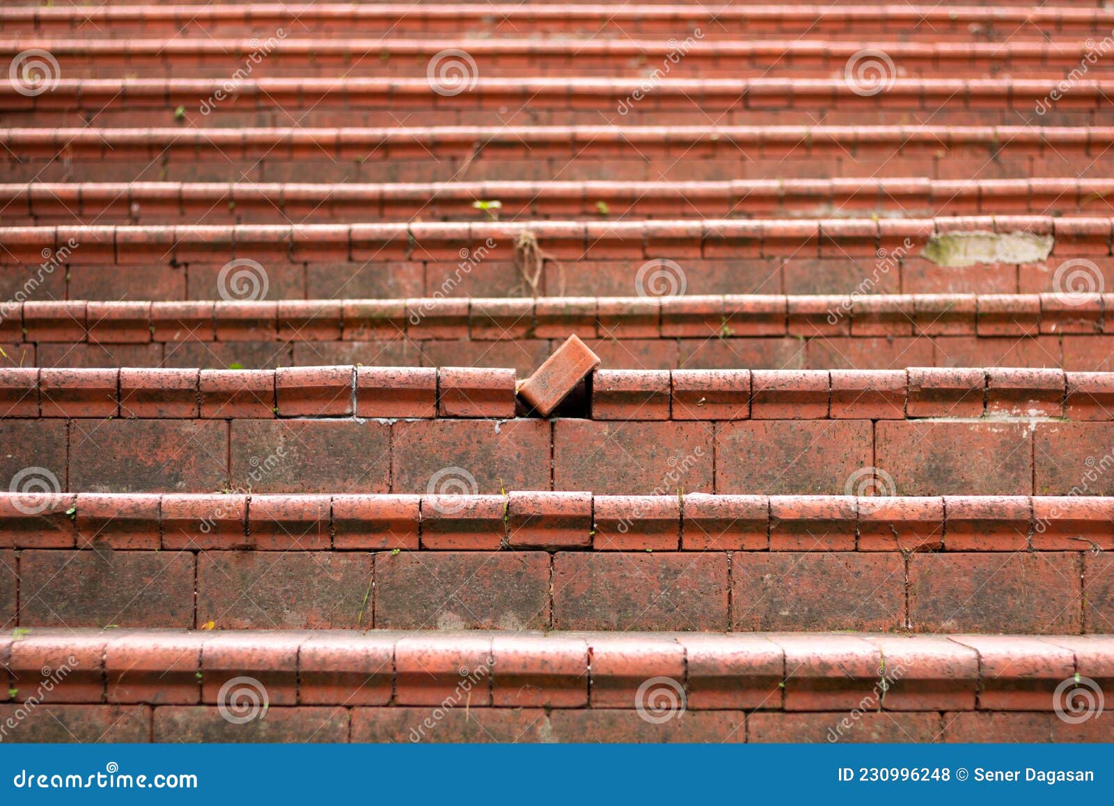 A Displaced Brick on the Stairs. Being Different Concept. Stock Photo ...