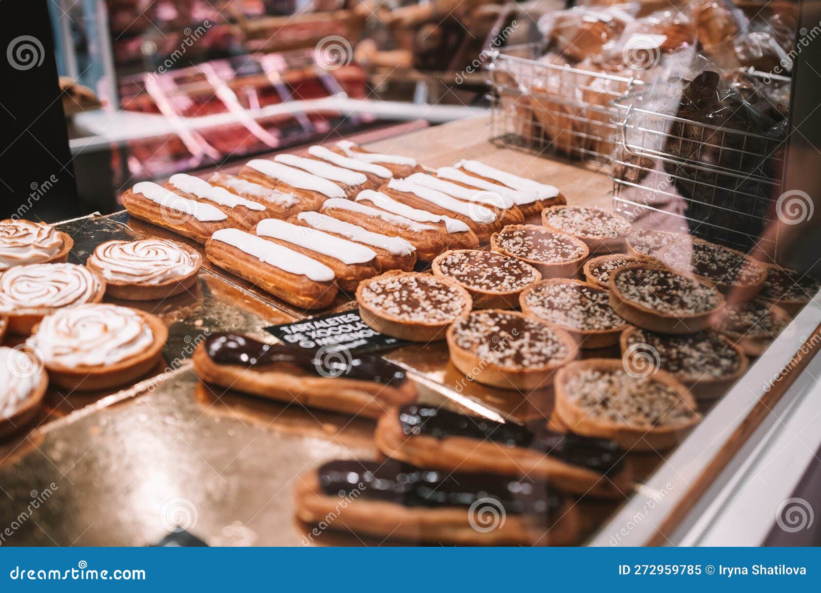 A Display Case Filled With Lots Of Different Types Of Cakes And Pies On