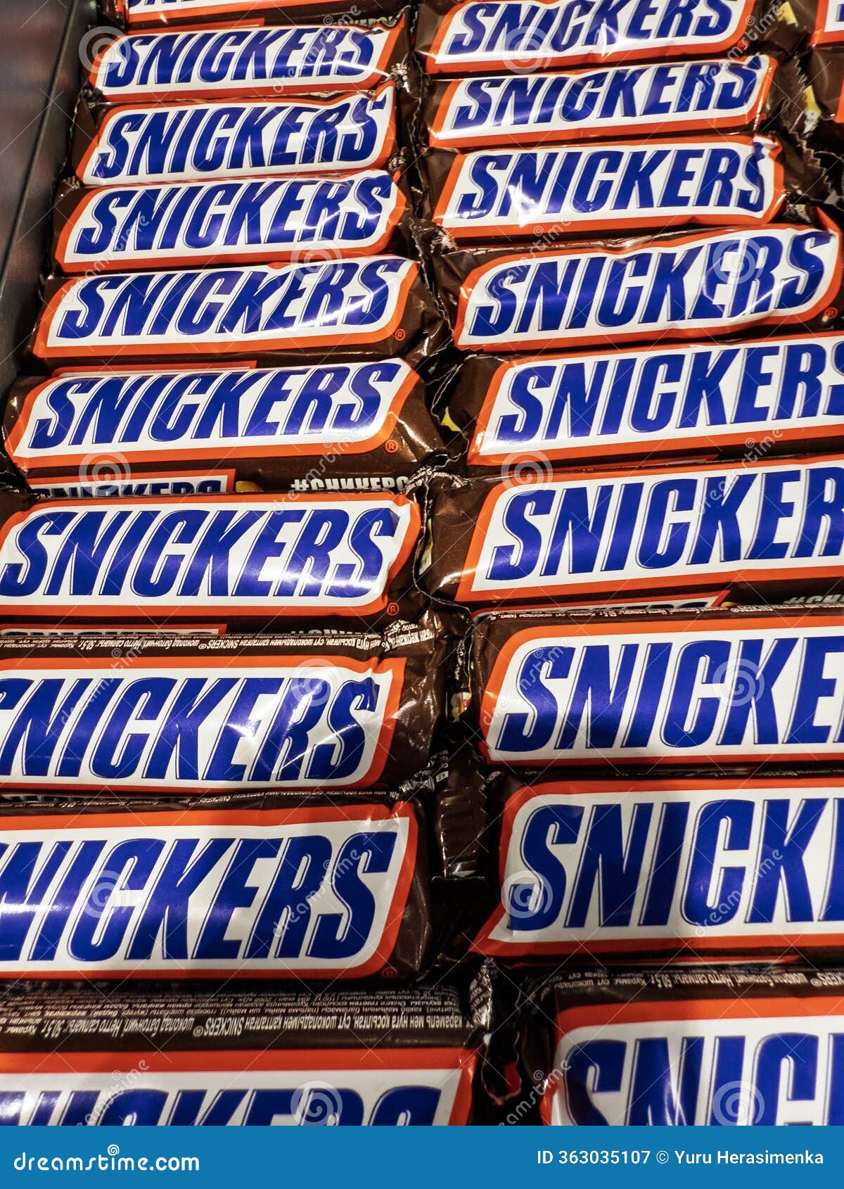 Display of Chocolate Bars Snickers with Various Sizes and Packaging in ...