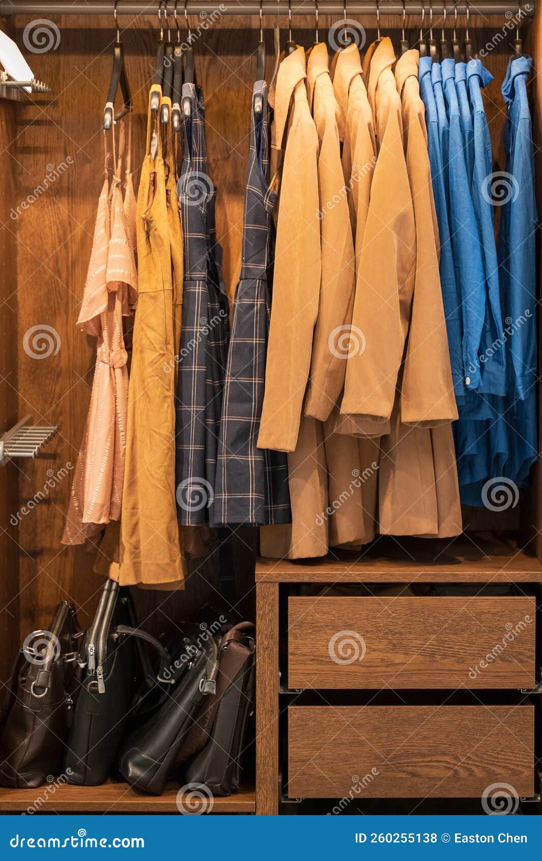 Display of Clothes in Wardrobe Stock Photo - Image of interior ...