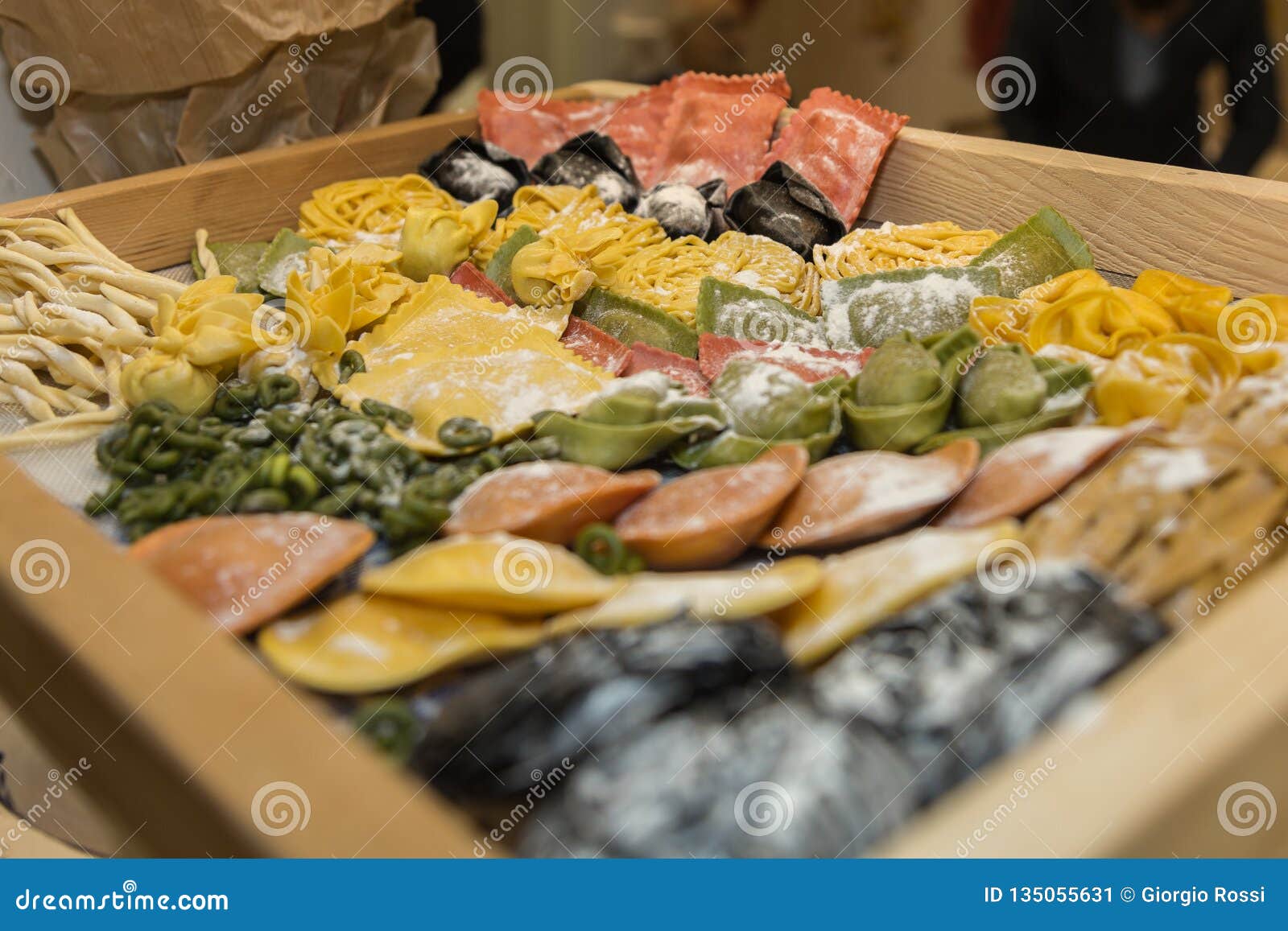 Display of a Food Store with Various Rows of Raw Coloured Pasta Stock ...