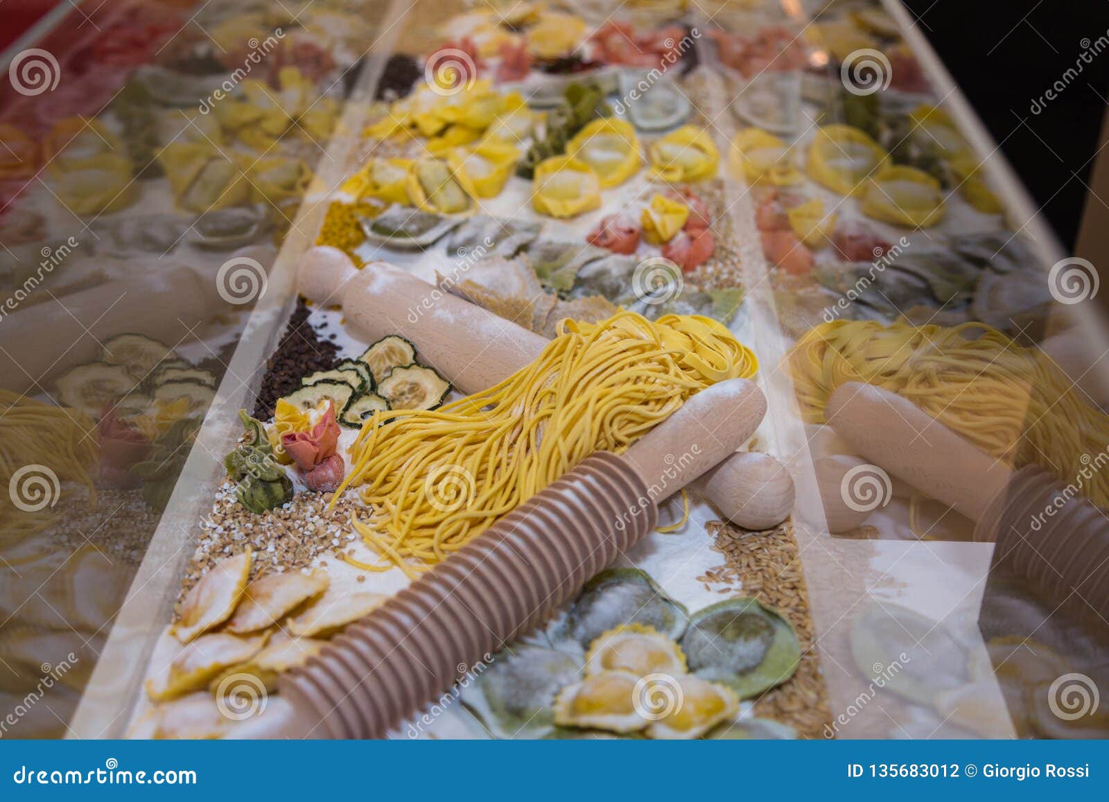 Display of a Food Store with Various Rows of Raw Coloured Pasta Stock ...