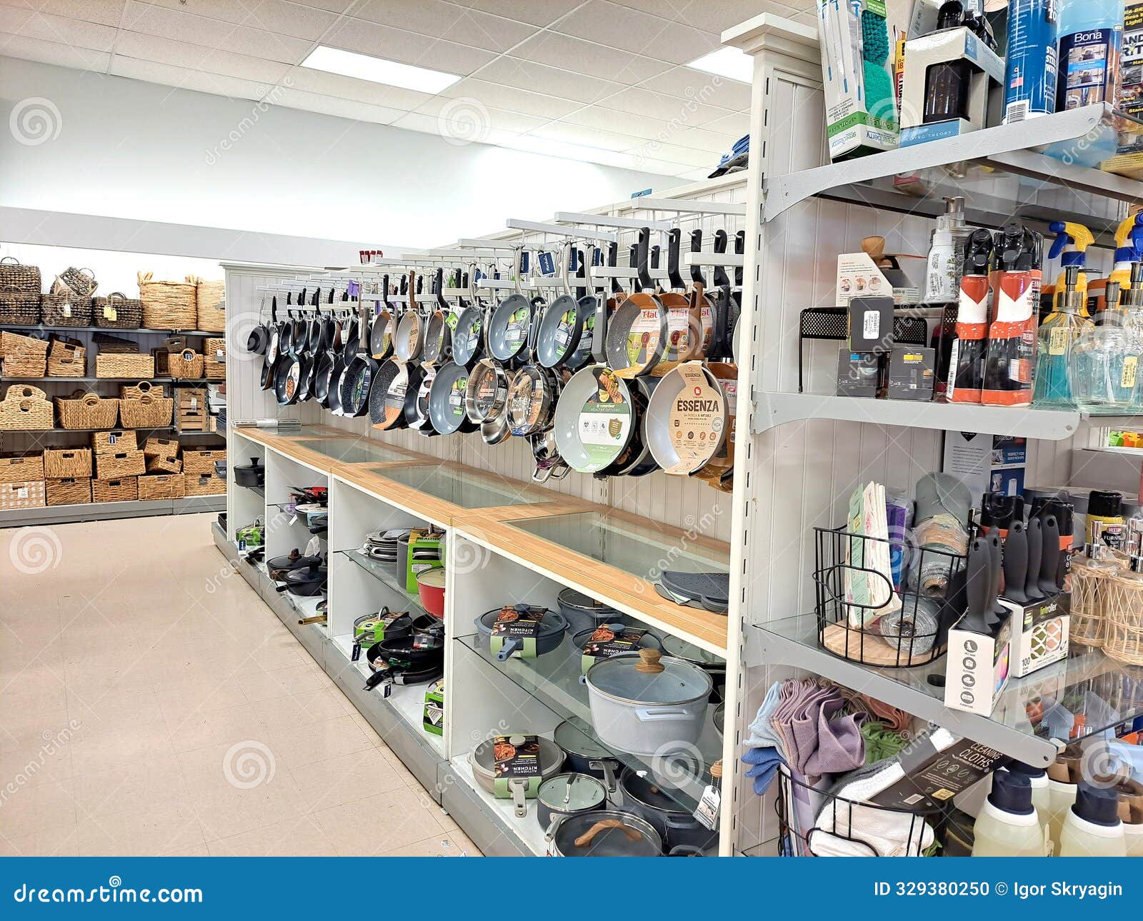 Display in a Large Supermarket with Kitchen Goods. Pans and Pots on the ...