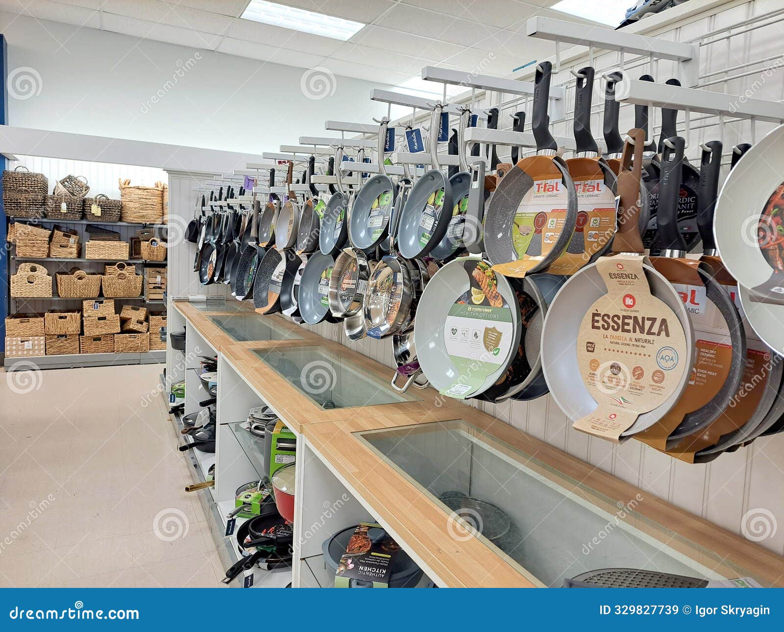 Display in a Large Supermarket with Kitchen Goods. Pans and Pots on the ...