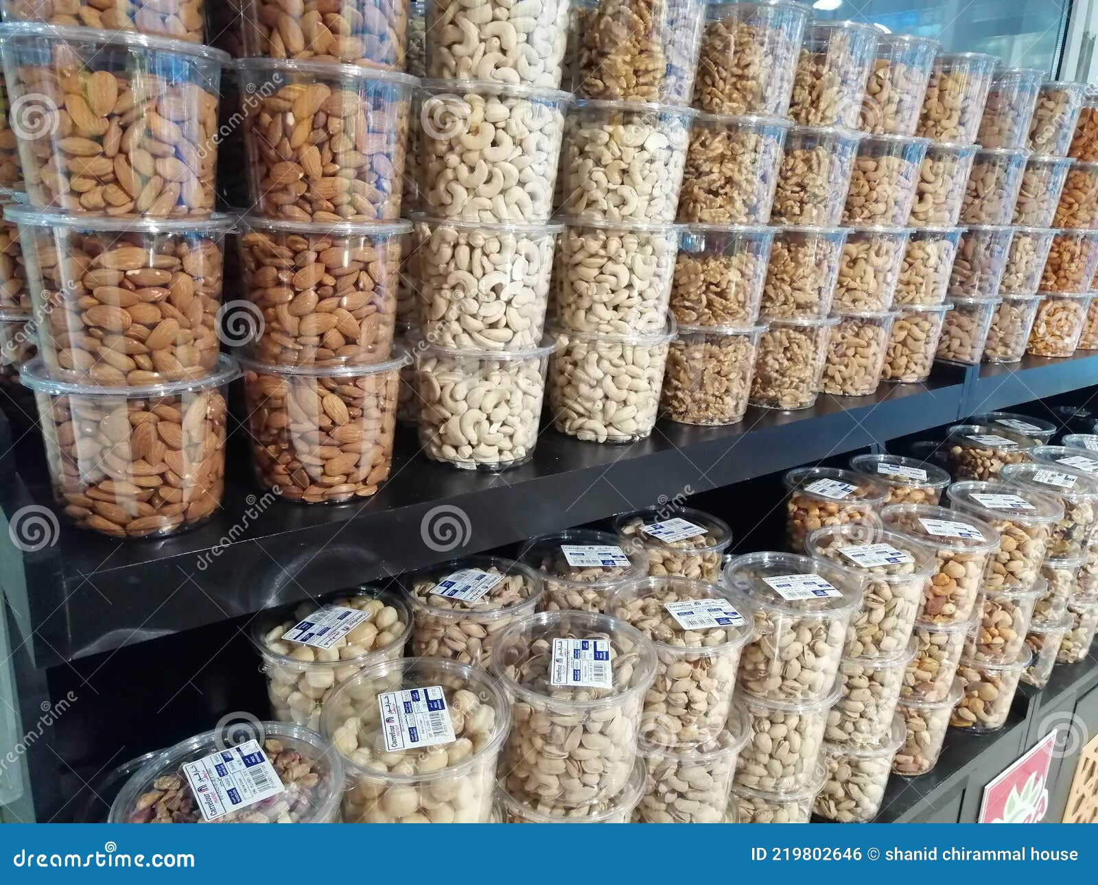 Display of packed dry nuts stock photo. Image of food - 219802646