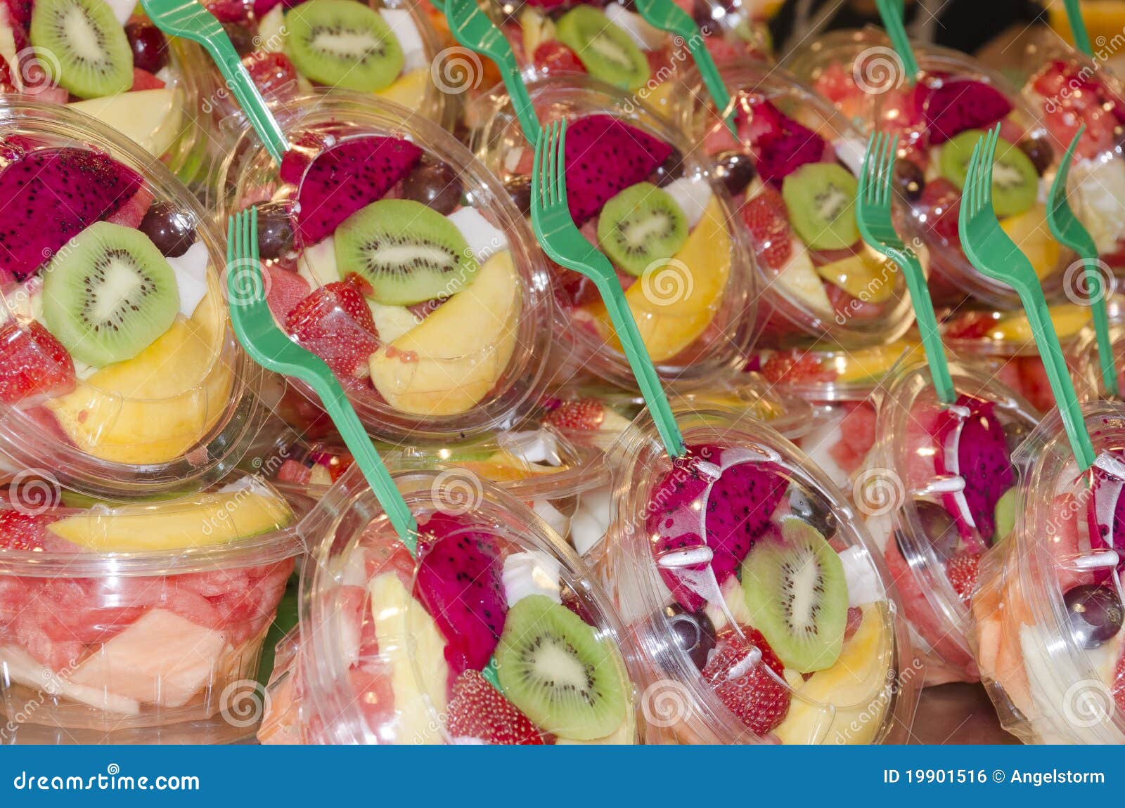 Display of Portions of Fruit with Fork Stock Photo - Image of ...