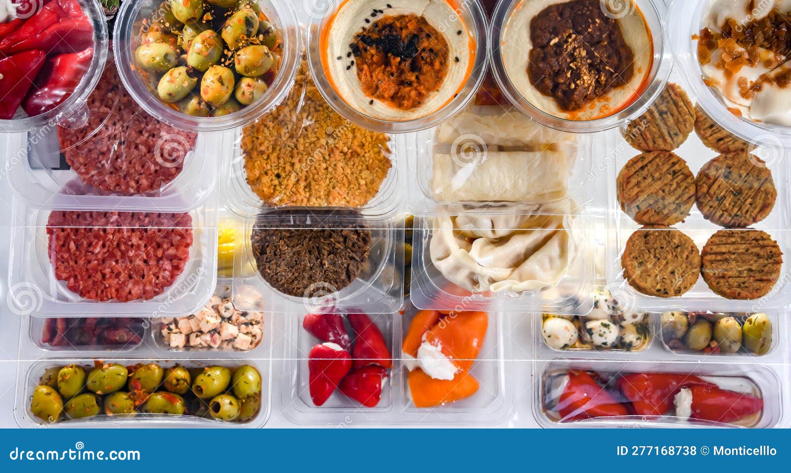 A Display of Prepackaged Food Products in Plastic Boxes Stock Photo ...