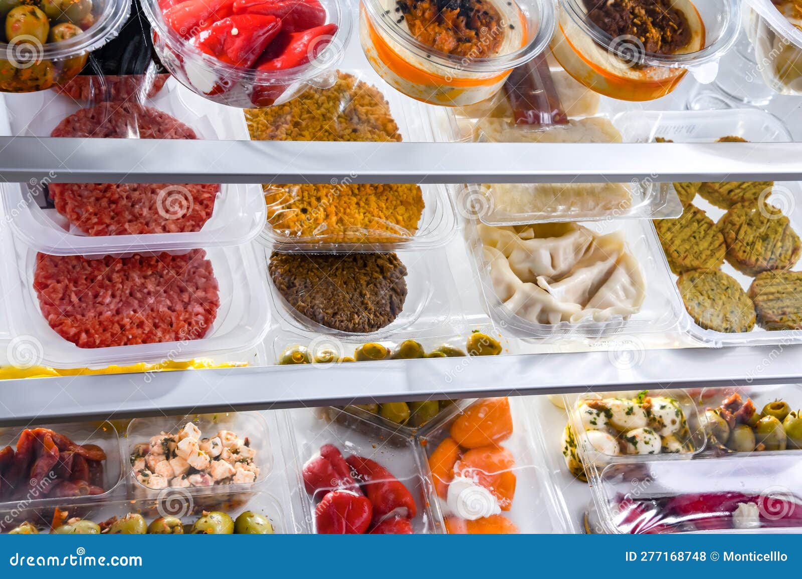 A Display of Prepackaged Food Products in Plastic Boxes Stock Photo ...