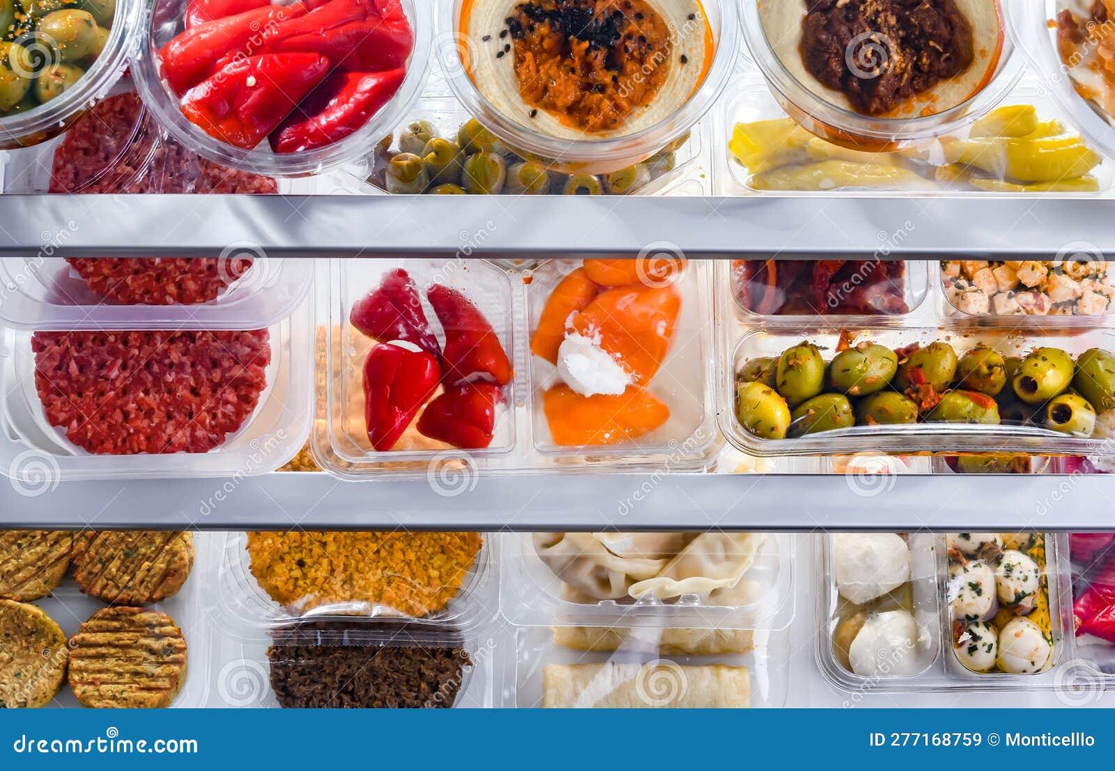 A Display of Prepackaged Food Products in Plastic Boxes Stock Image ...